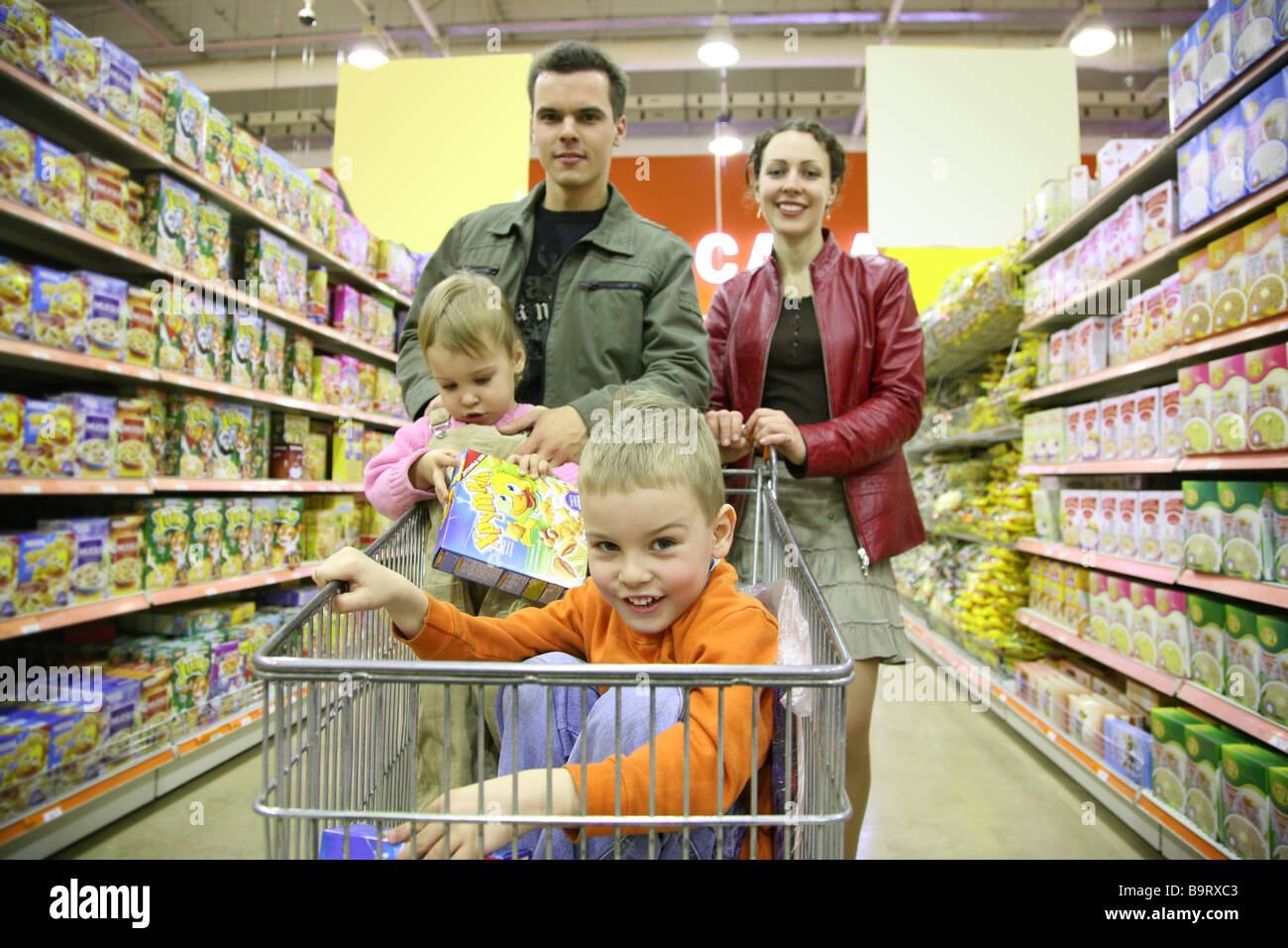 family in shop Stock Photo - Alamy