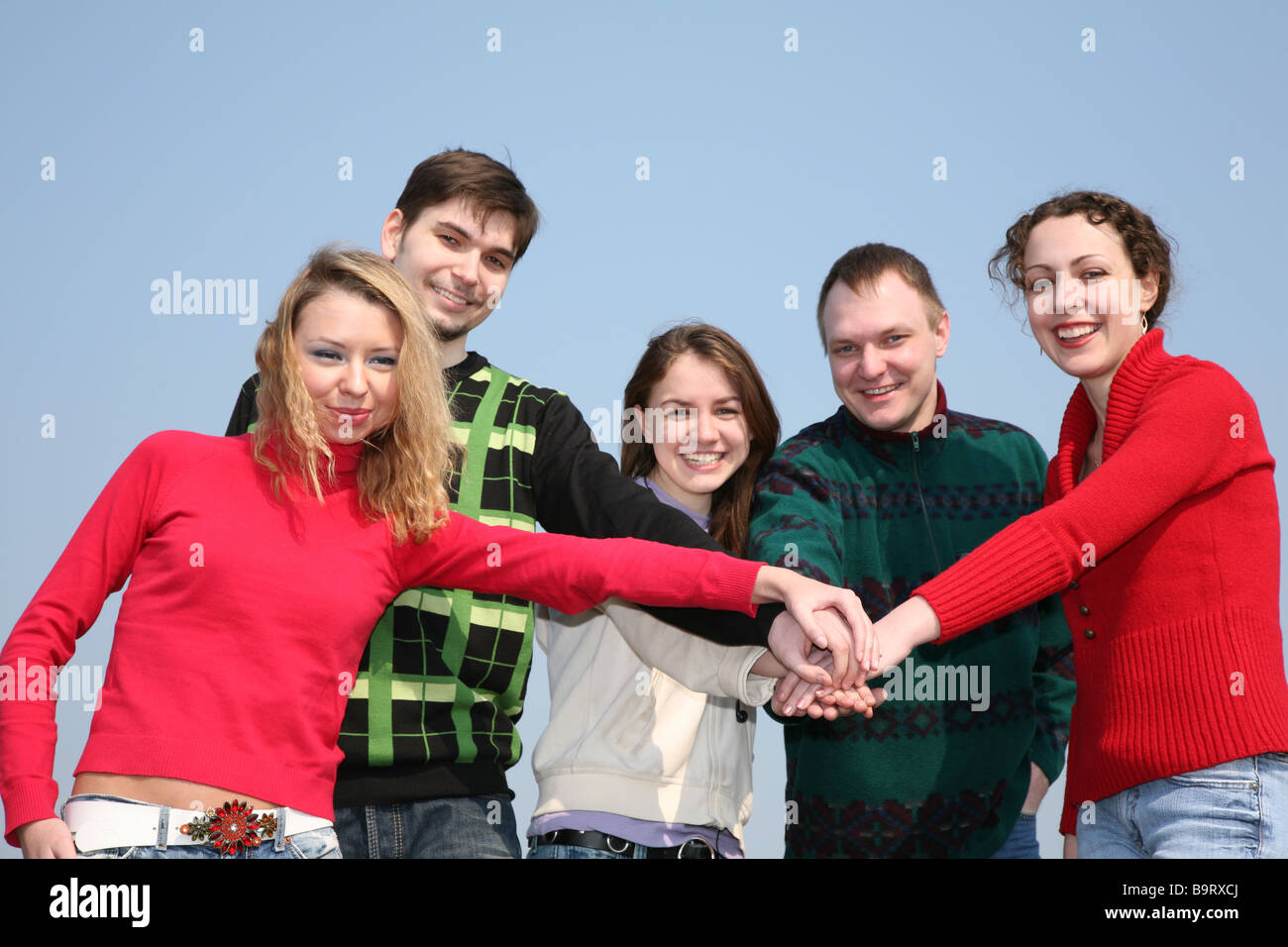 friends with hands Stock Photo - Alamy
