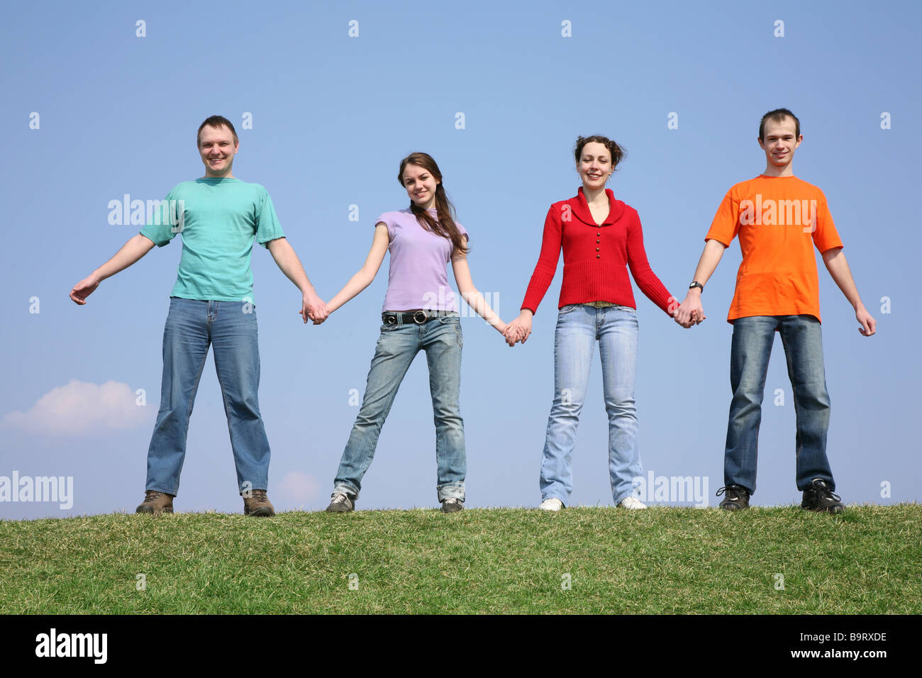 chain friends on meadow Stock Photo - Alamy