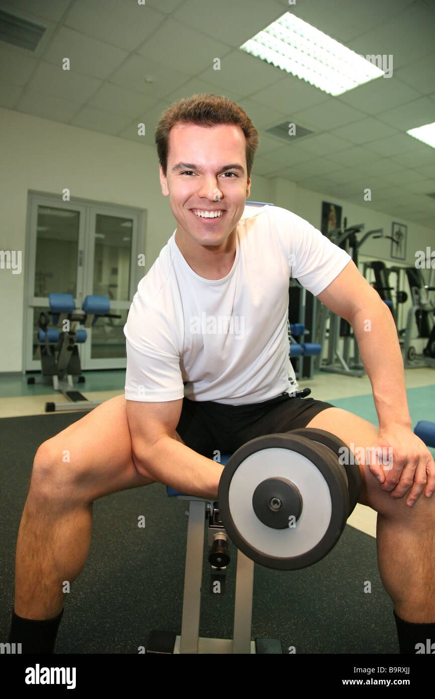 gym man with dumbbell 2 Stock Photo - Alamy