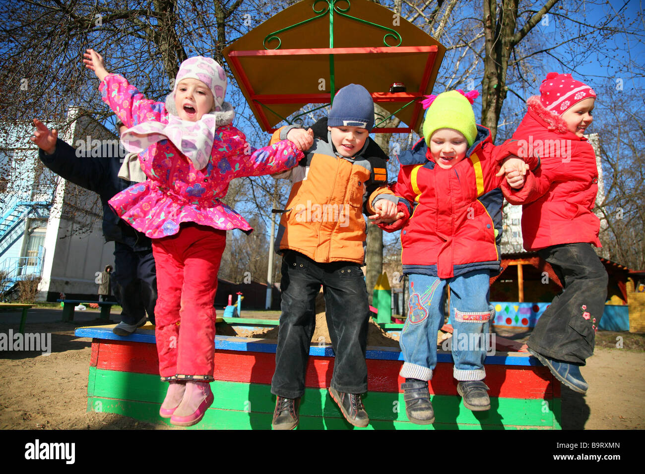 jumping team in kindergarten Stock Photo - Alamy