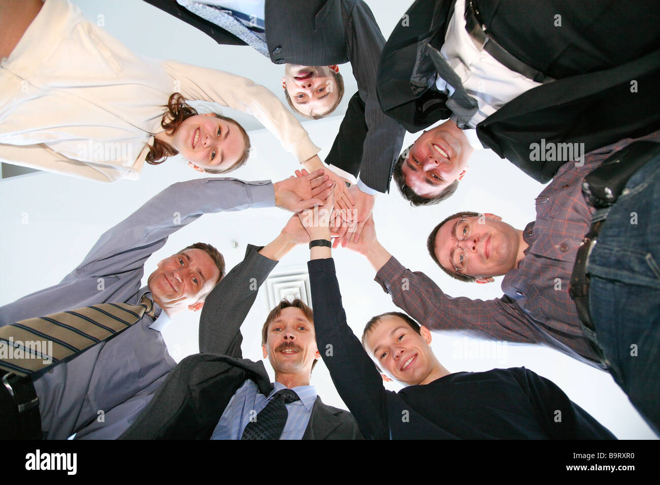 friends circle with hands Stock Photo - Alamy