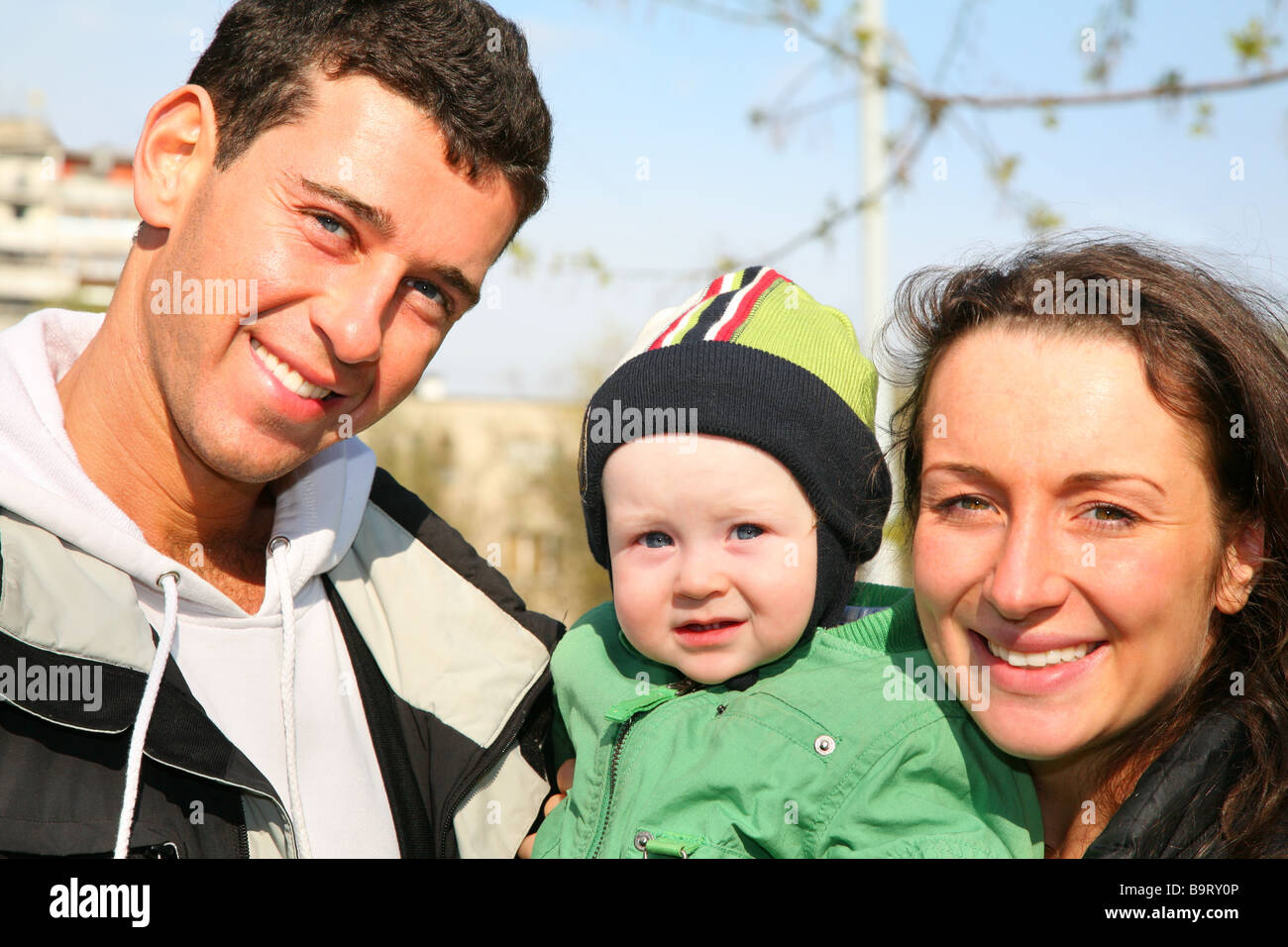 family with baby faces Stock Photo - Alamy