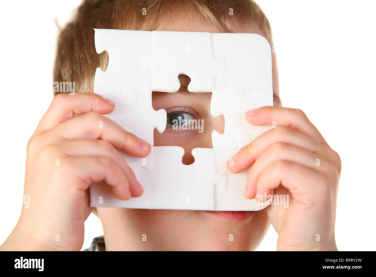 boy with hole puzzle Stock Photo - Alamy