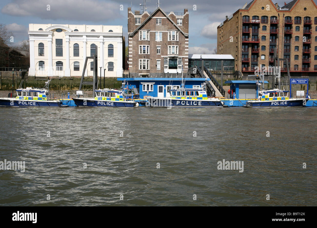 Metropolitan Police boats on River Thames, Wapping, London Stock Photo ...