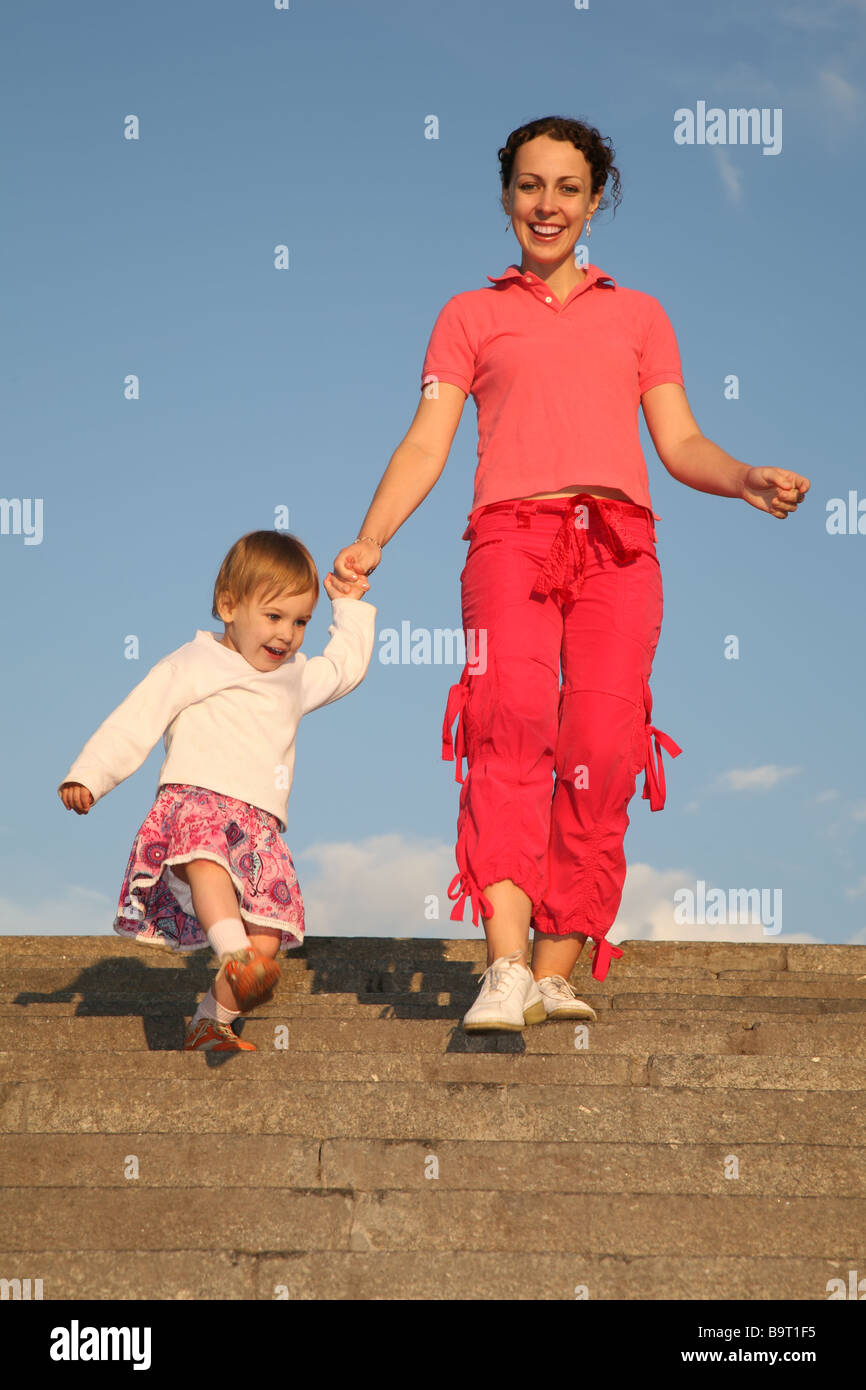 Two women on step ladder hi-res stock photography and images - Alamy