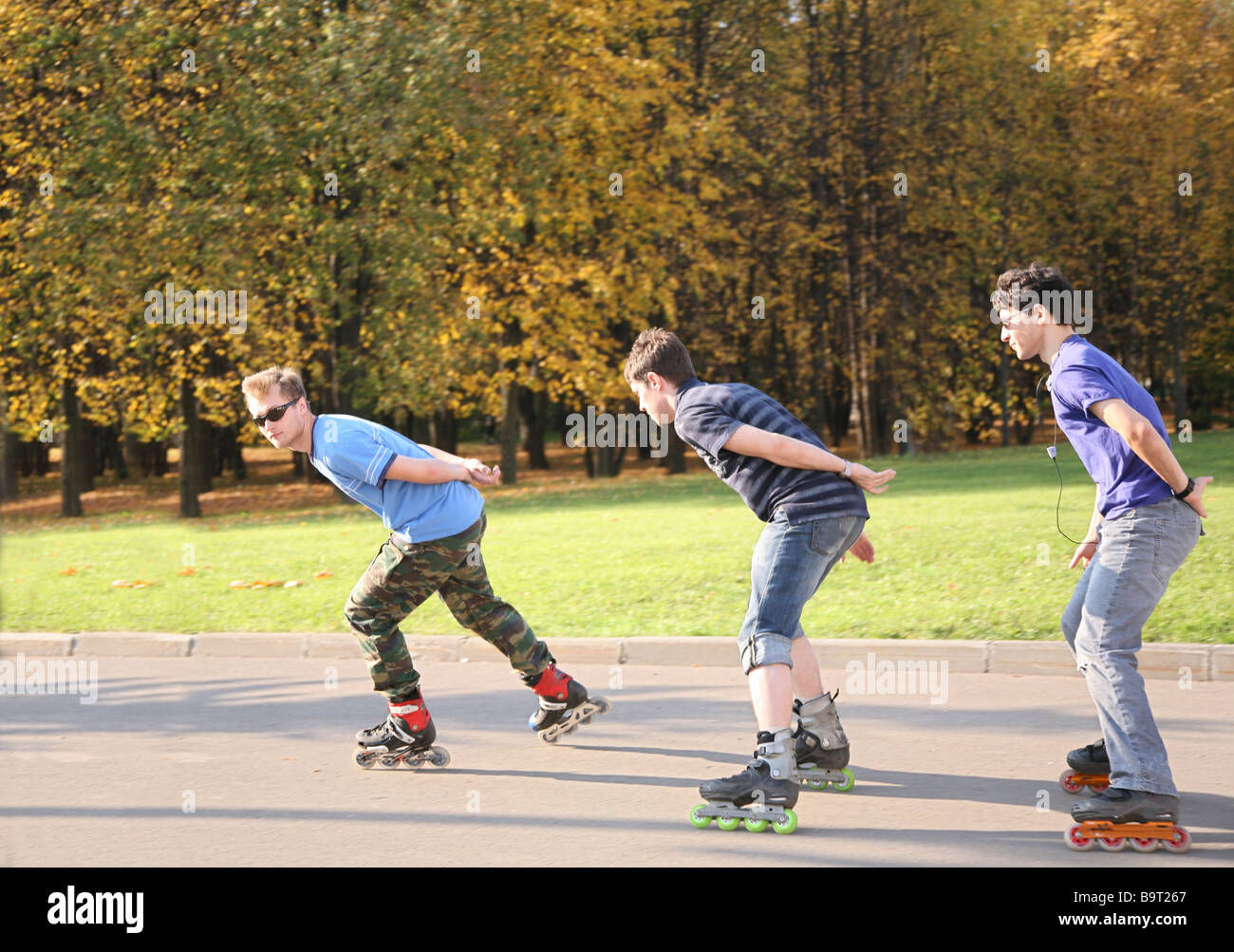 three rollers in the motion Stock Photo - Alamy