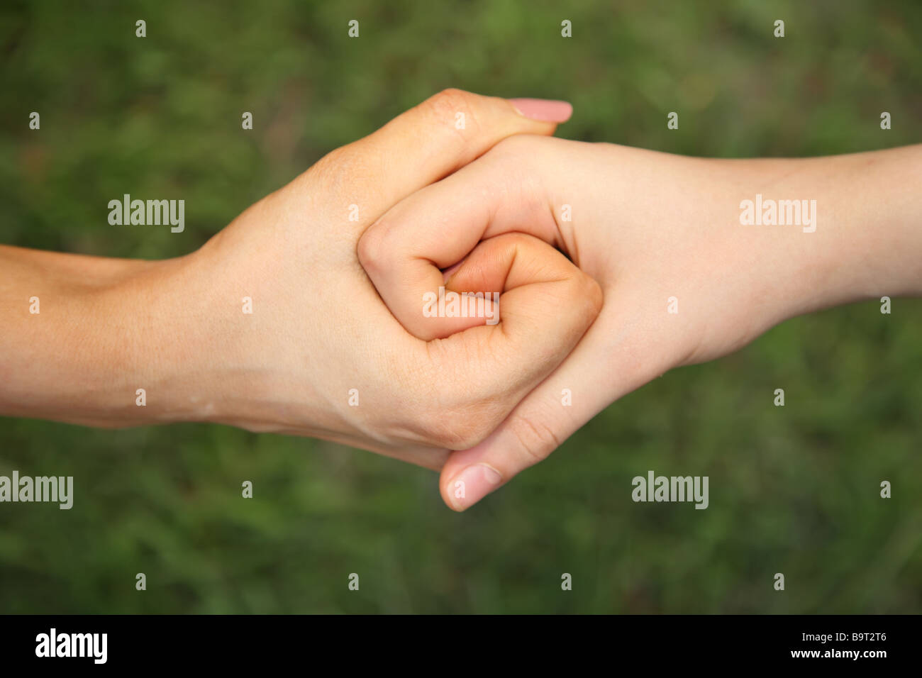 two coupled hands Stock Photo - Alamy