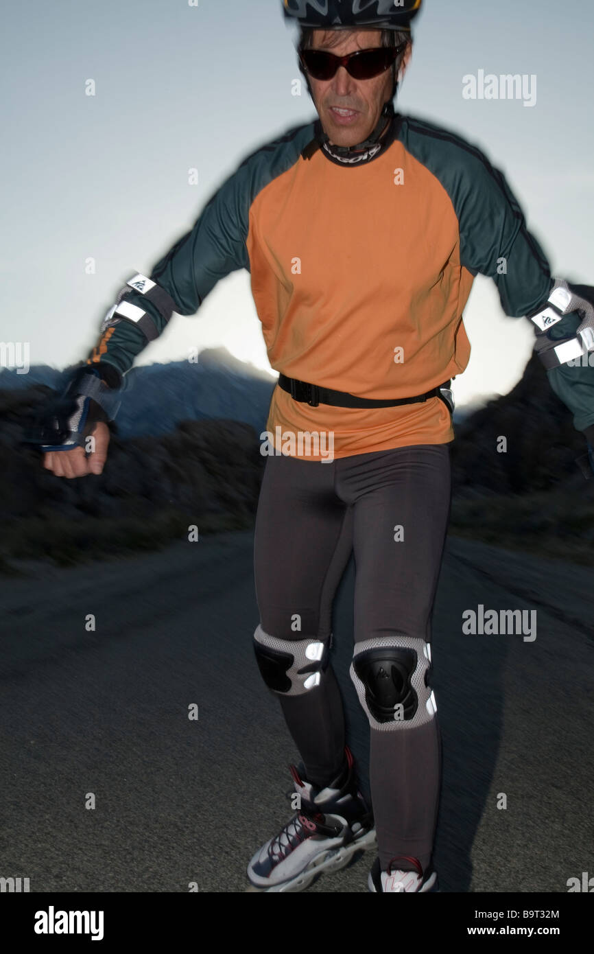 Man skating through rocks Stock Photo - Alamy