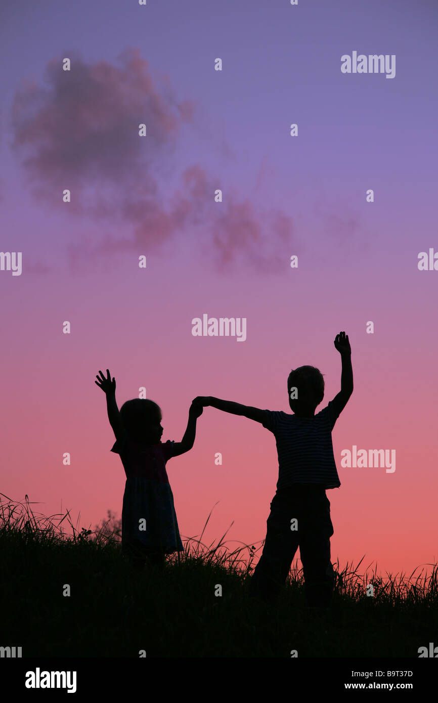 children on sunset Stock Photo - Alamy