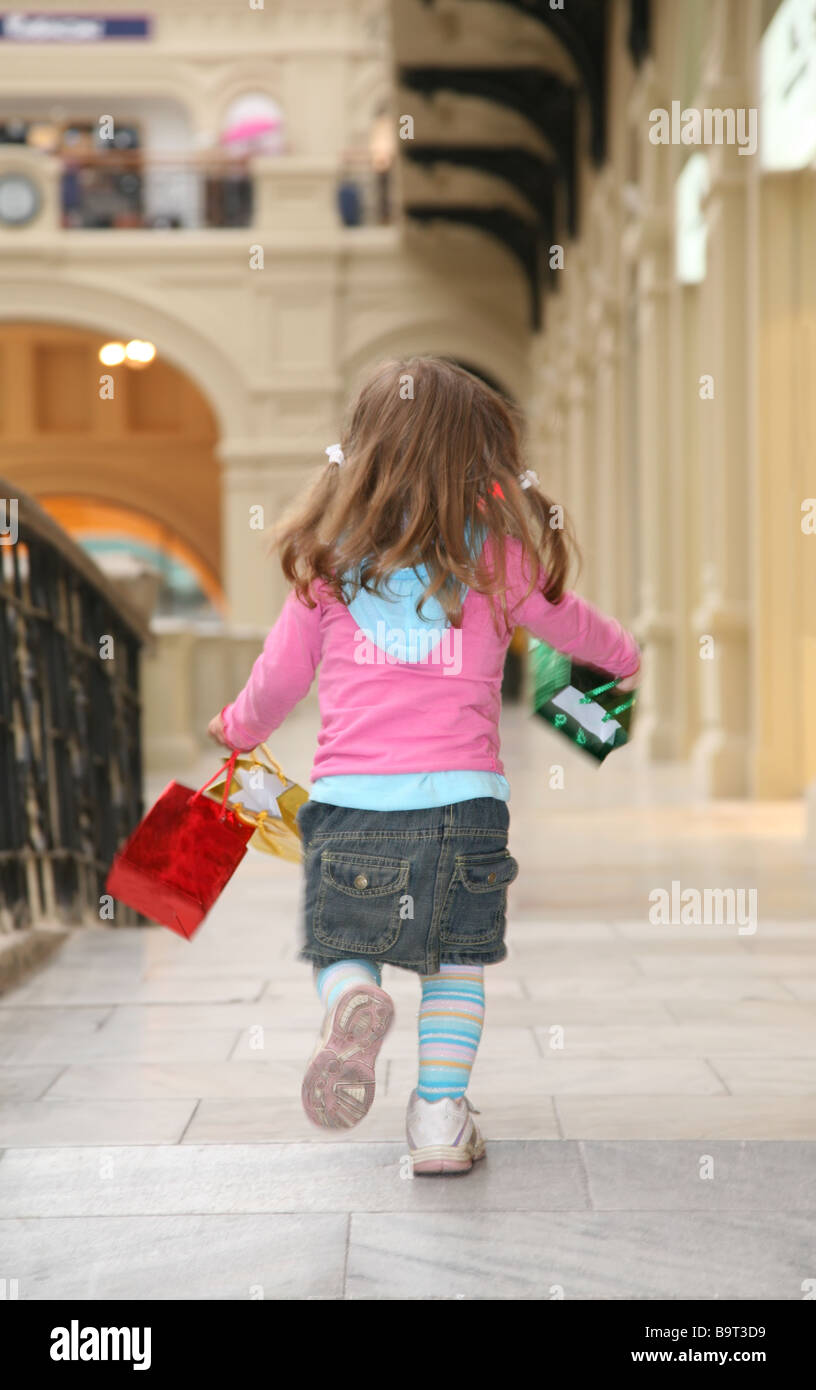 child walk with bags Stock Photo - Alamy
