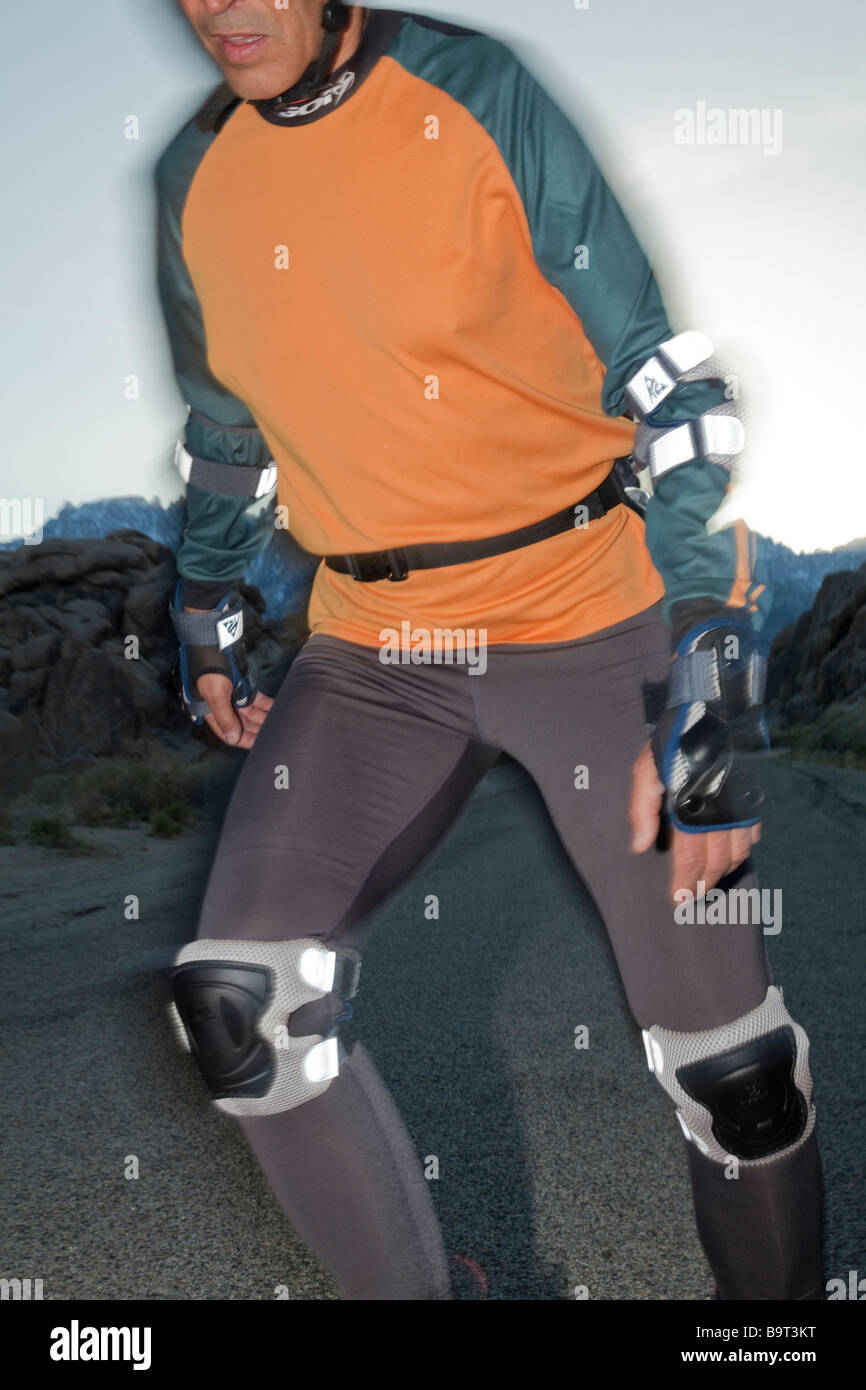 Man skating through rocks Stock Photo - Alamy