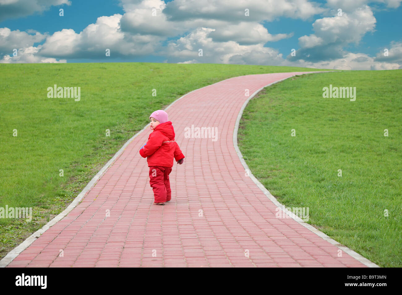 child on the field road Stock Photo - Alamy