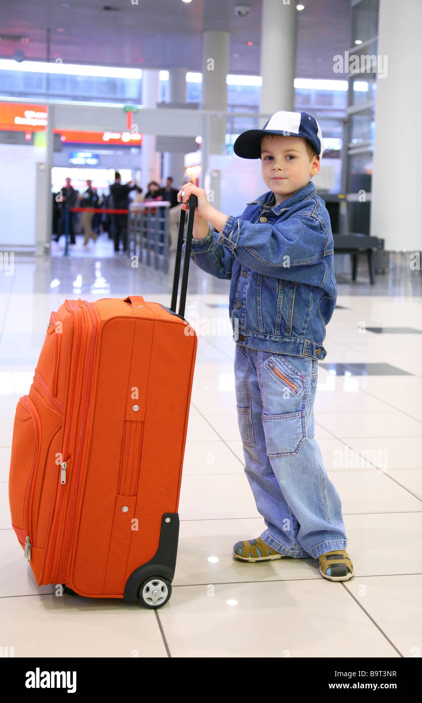 boy with case Stock Photo - Alamy