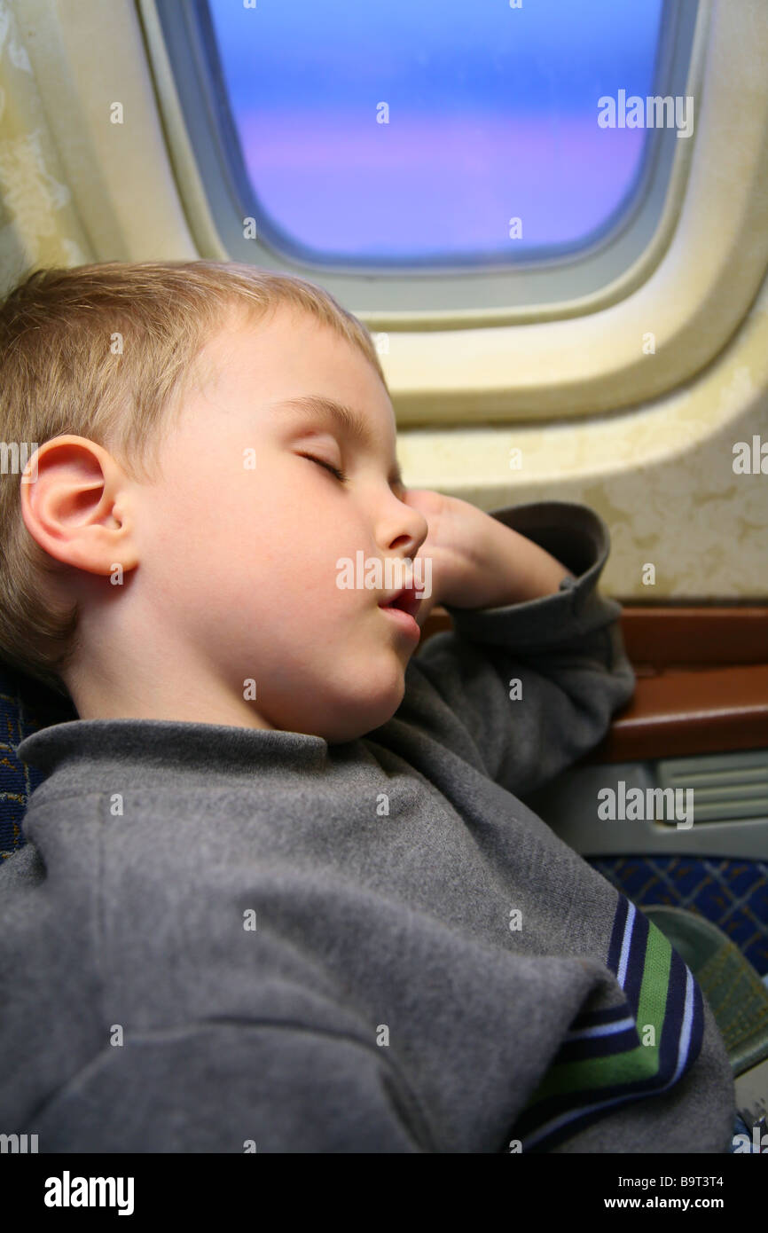 boy airplane sleep Stock Photo - Alamy