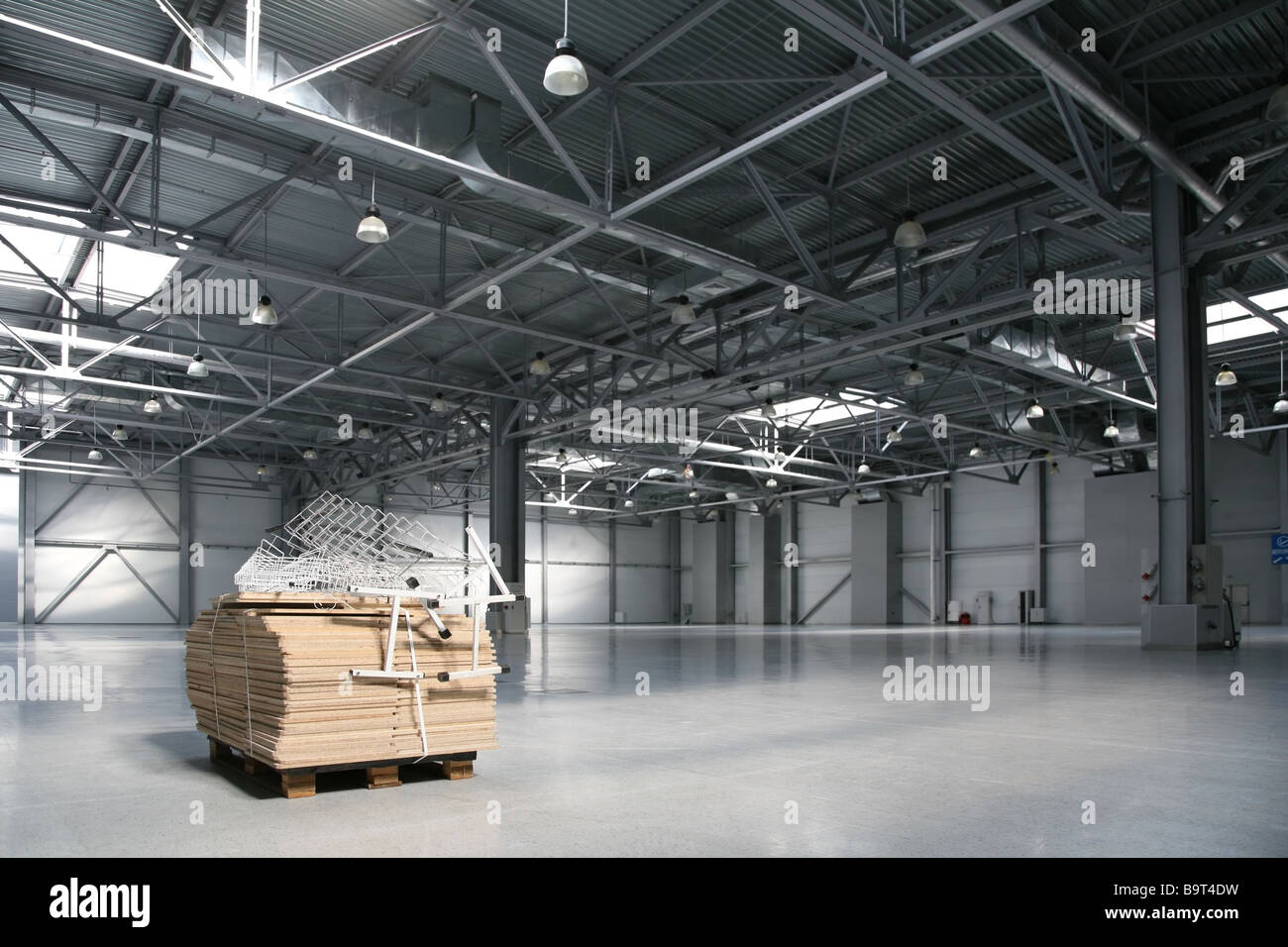 Warehouse of shopping center Stock Photo - Alamy