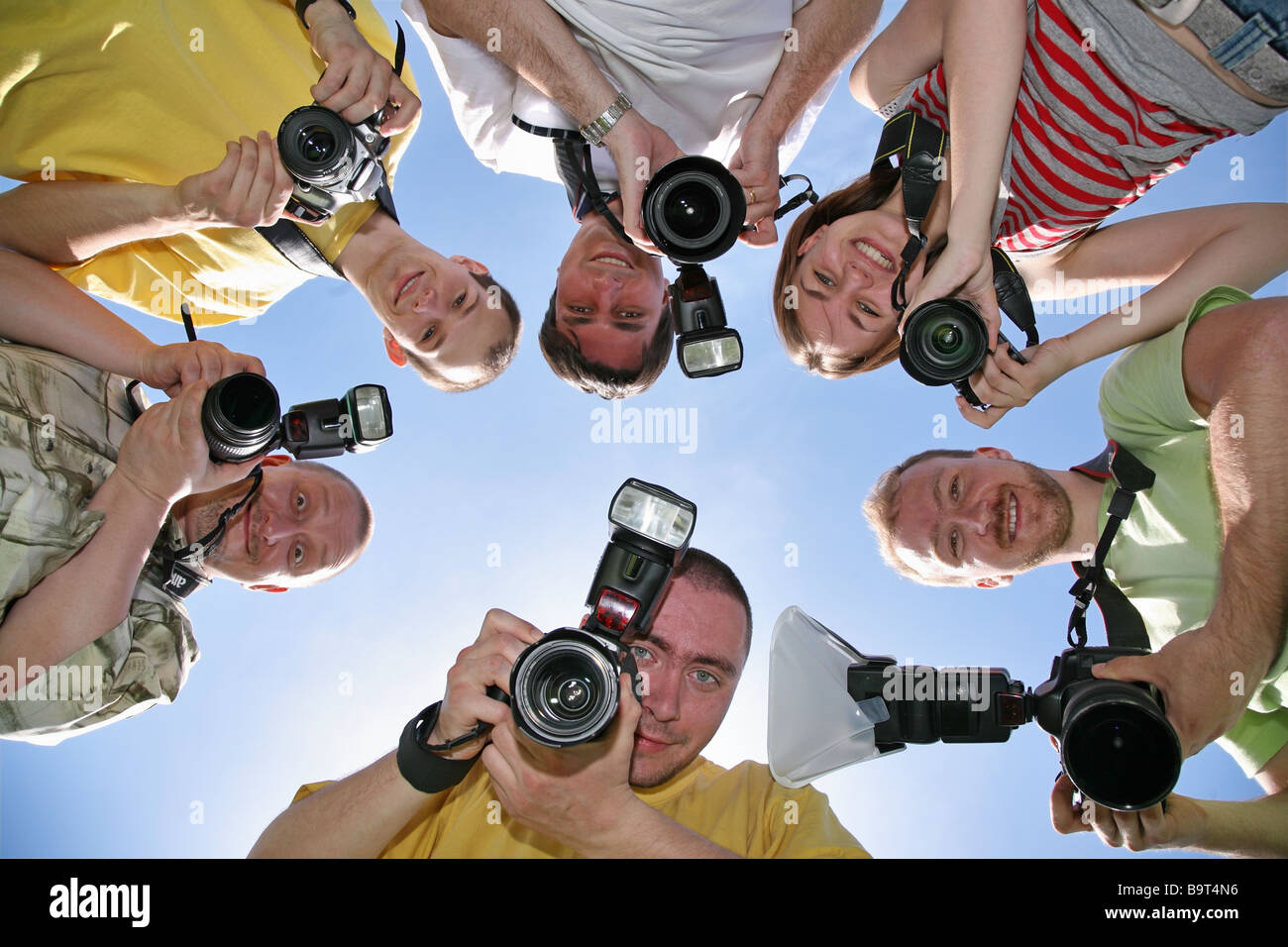 Six friends with cameras Stock Photo - Alamy