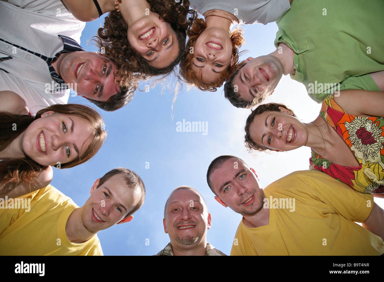 Nine friends are in a circle Stock Photo - Alamy
