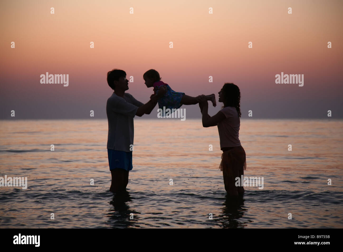 Family in the sea hi-res stock photography and images - Alamy