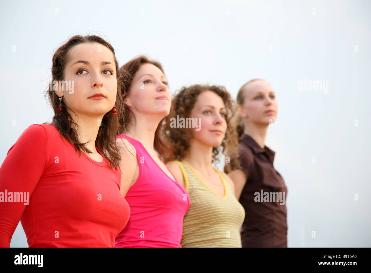 four young women Stock Photo - Alamy