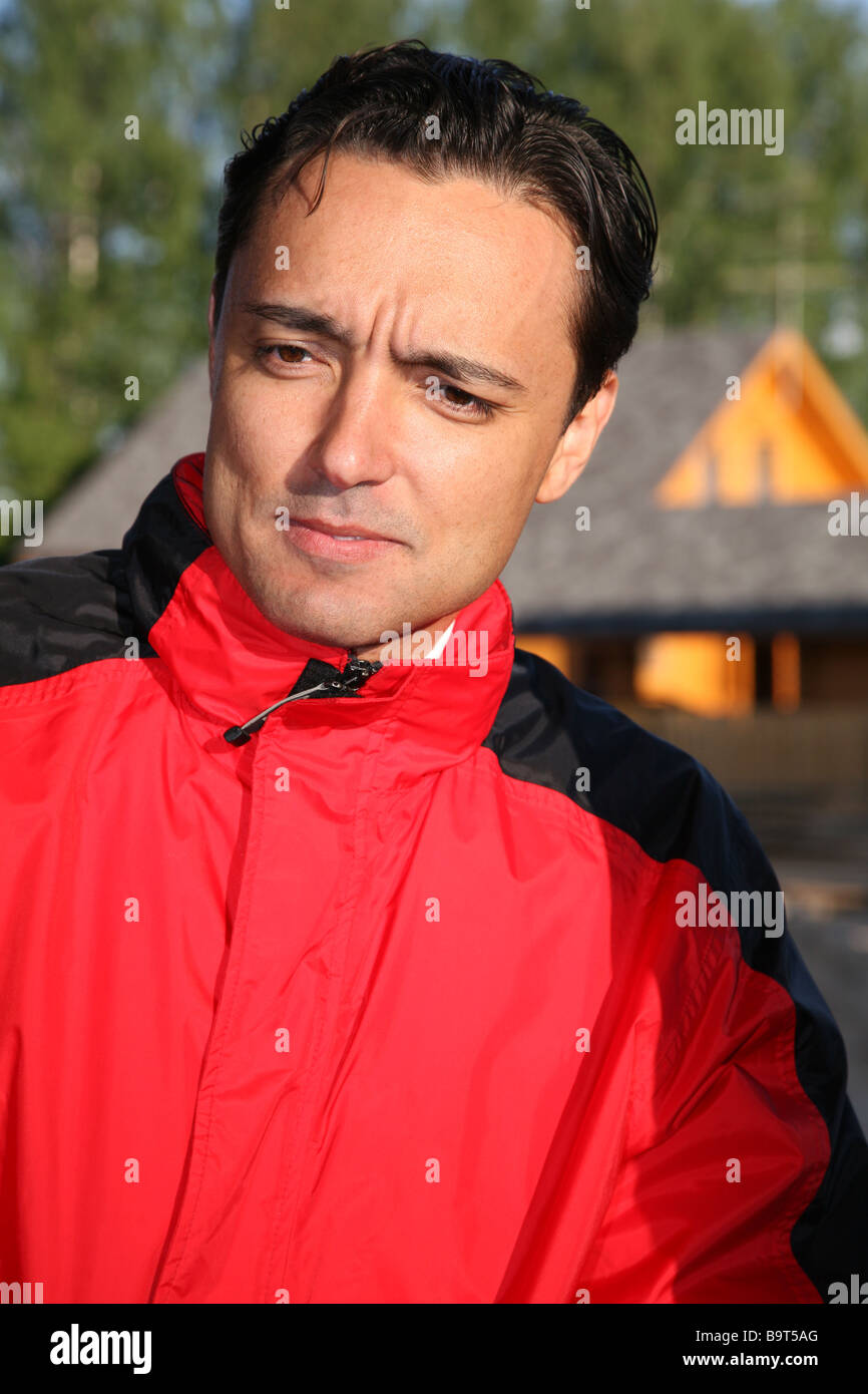 man in the red jacket Stock Photo - Alamy