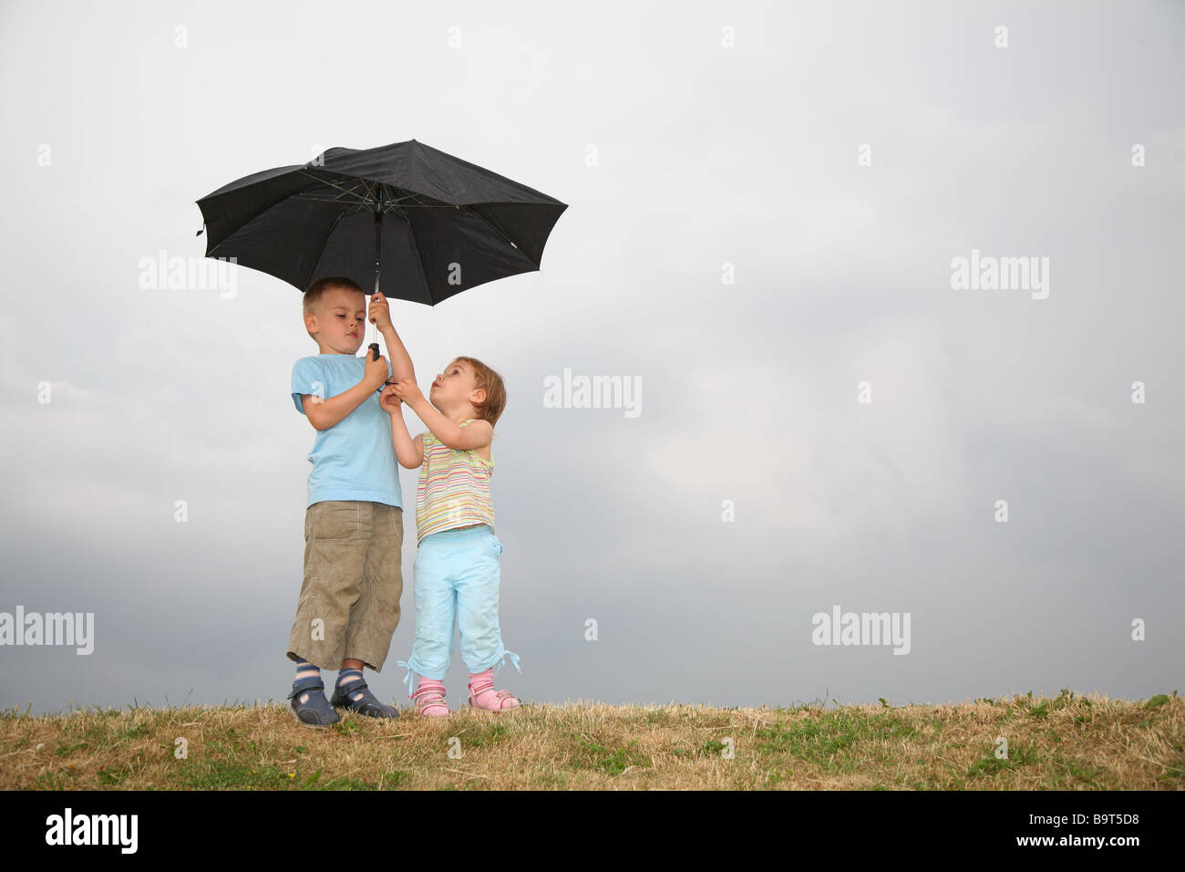 child with the umbrella Stock Photo - Alamy