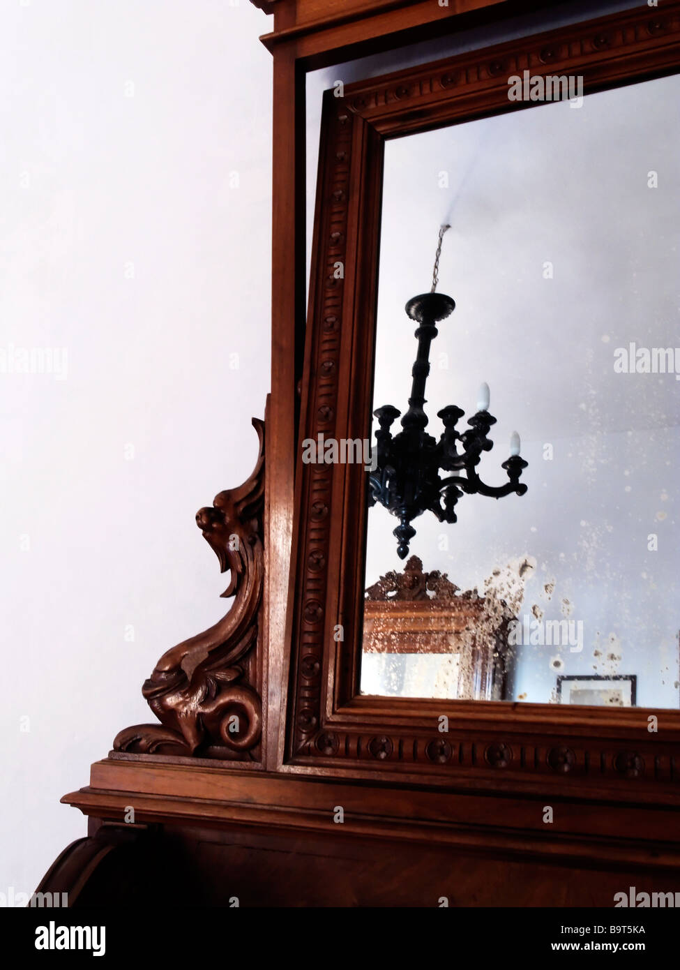 Antique Ceiling Light Reflection in Mirror Stock Photo - Alamy