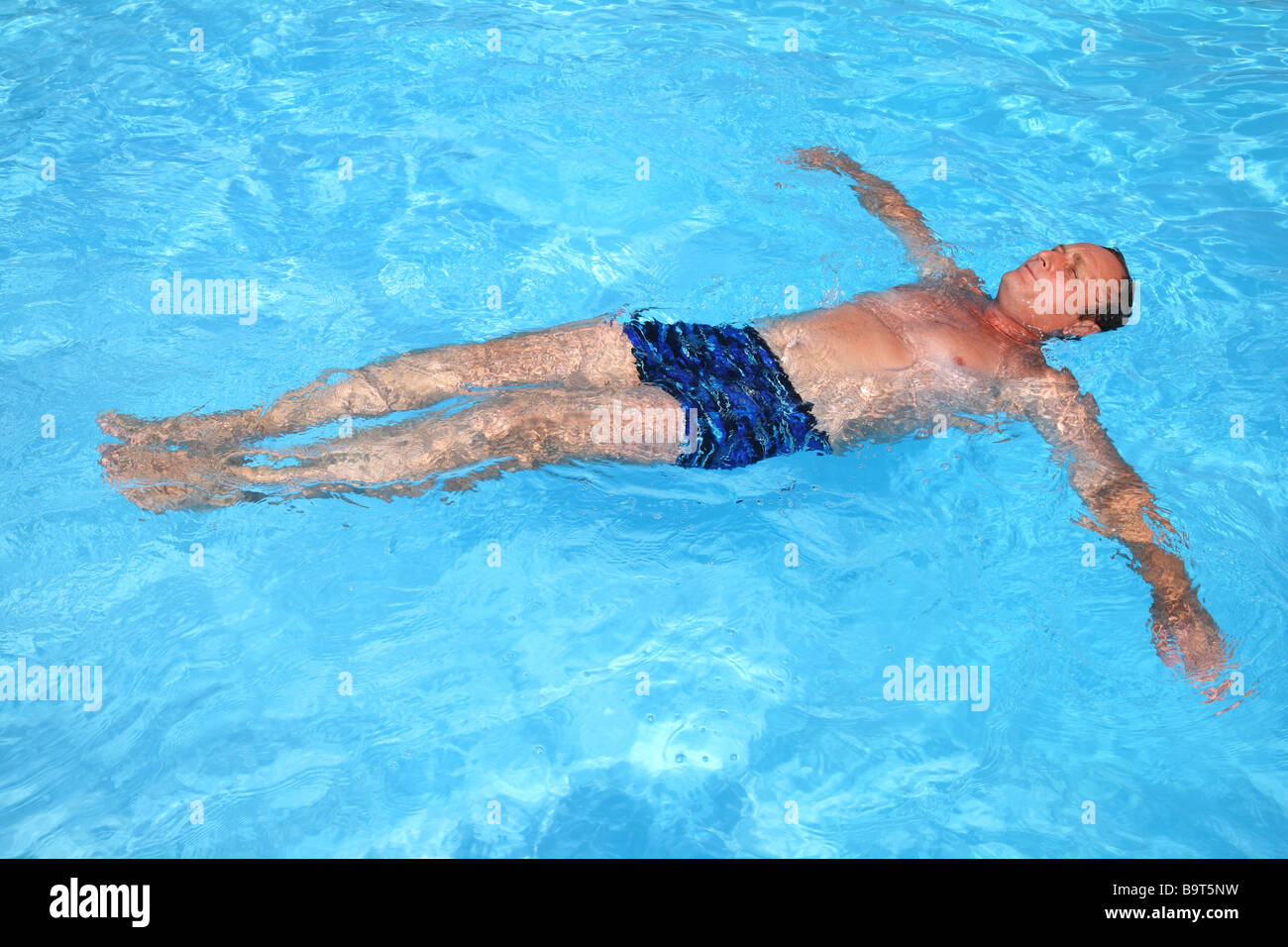 man in pool Stock Photo - Alamy