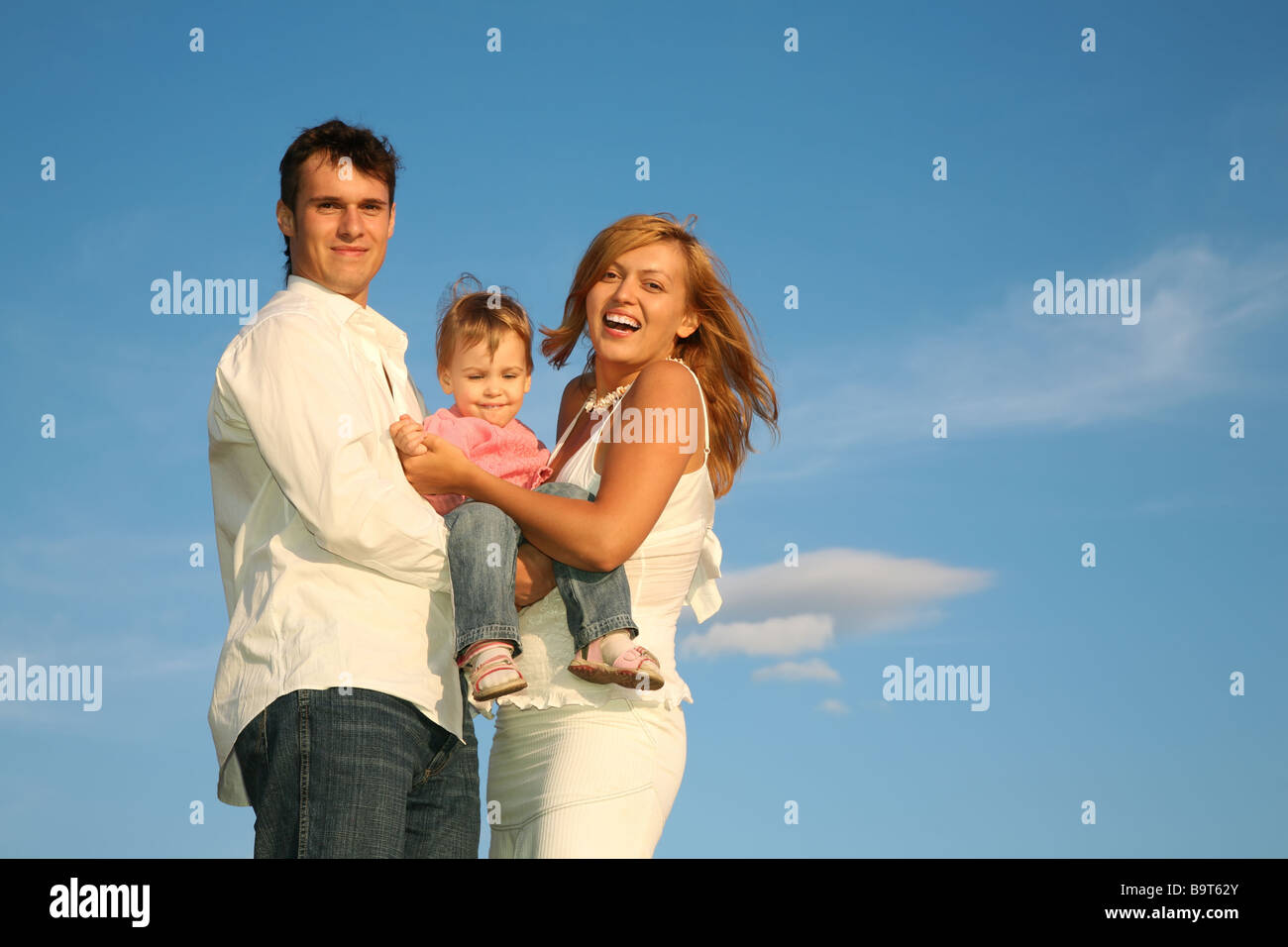 child with the parents Stock Photo - Alamy