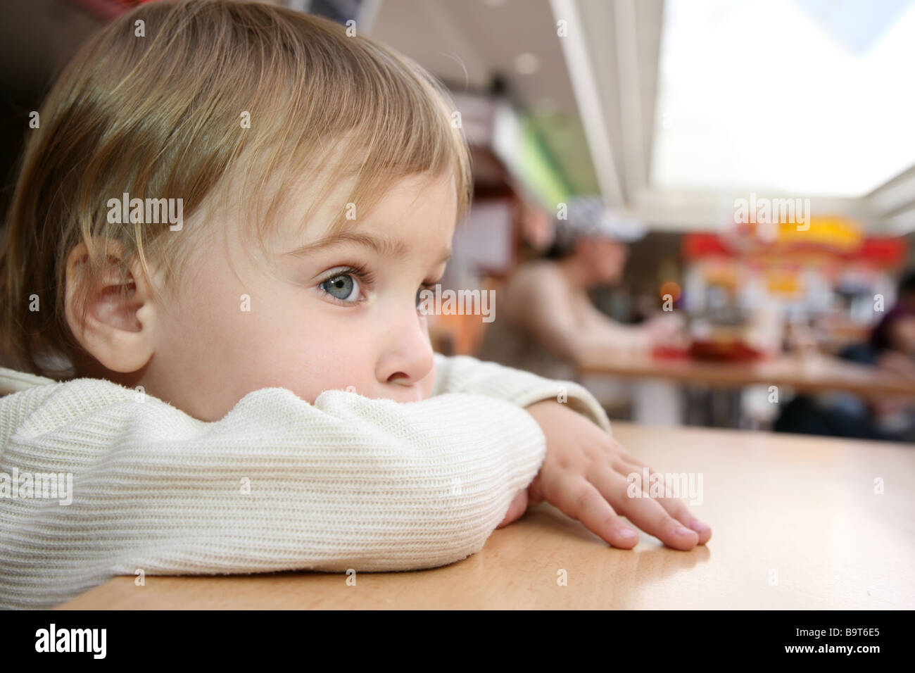 child at the table Stock Photo - Alamy