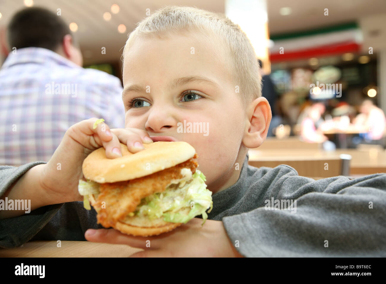 boy eats the sandwich Stock Photo - Alamy