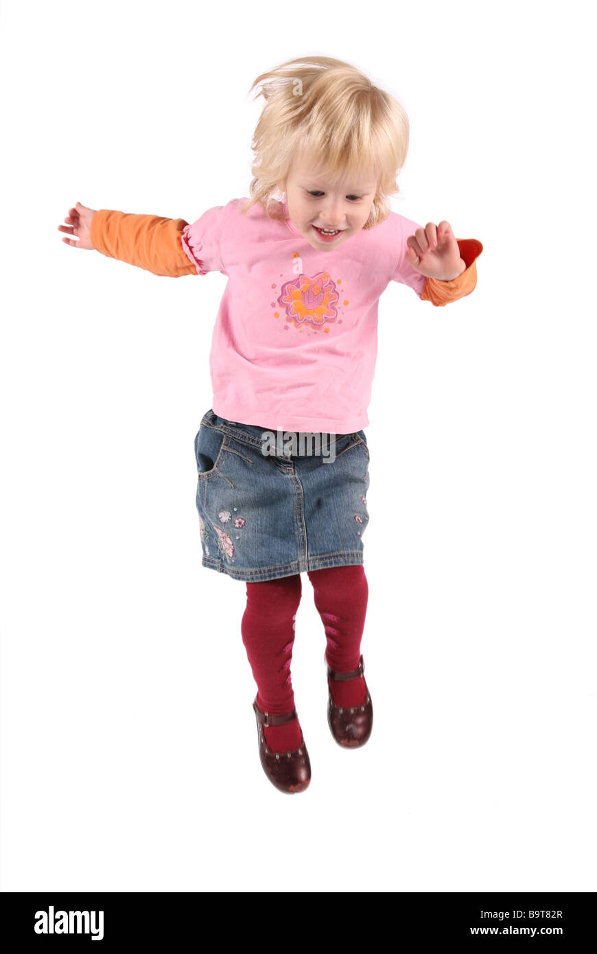 beautiful girl jump isolated on white Stock Photo - Alamy