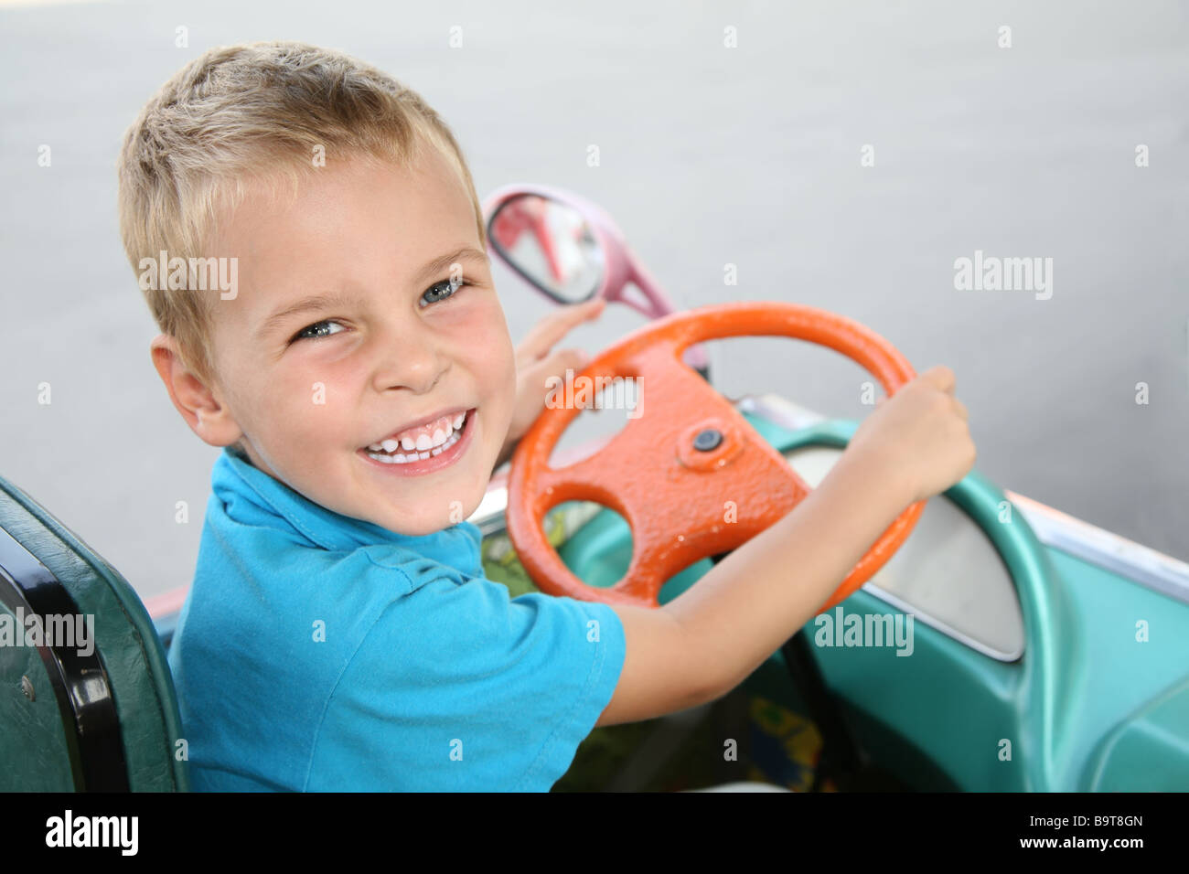 boy in toy car Stock Photo - Alamy