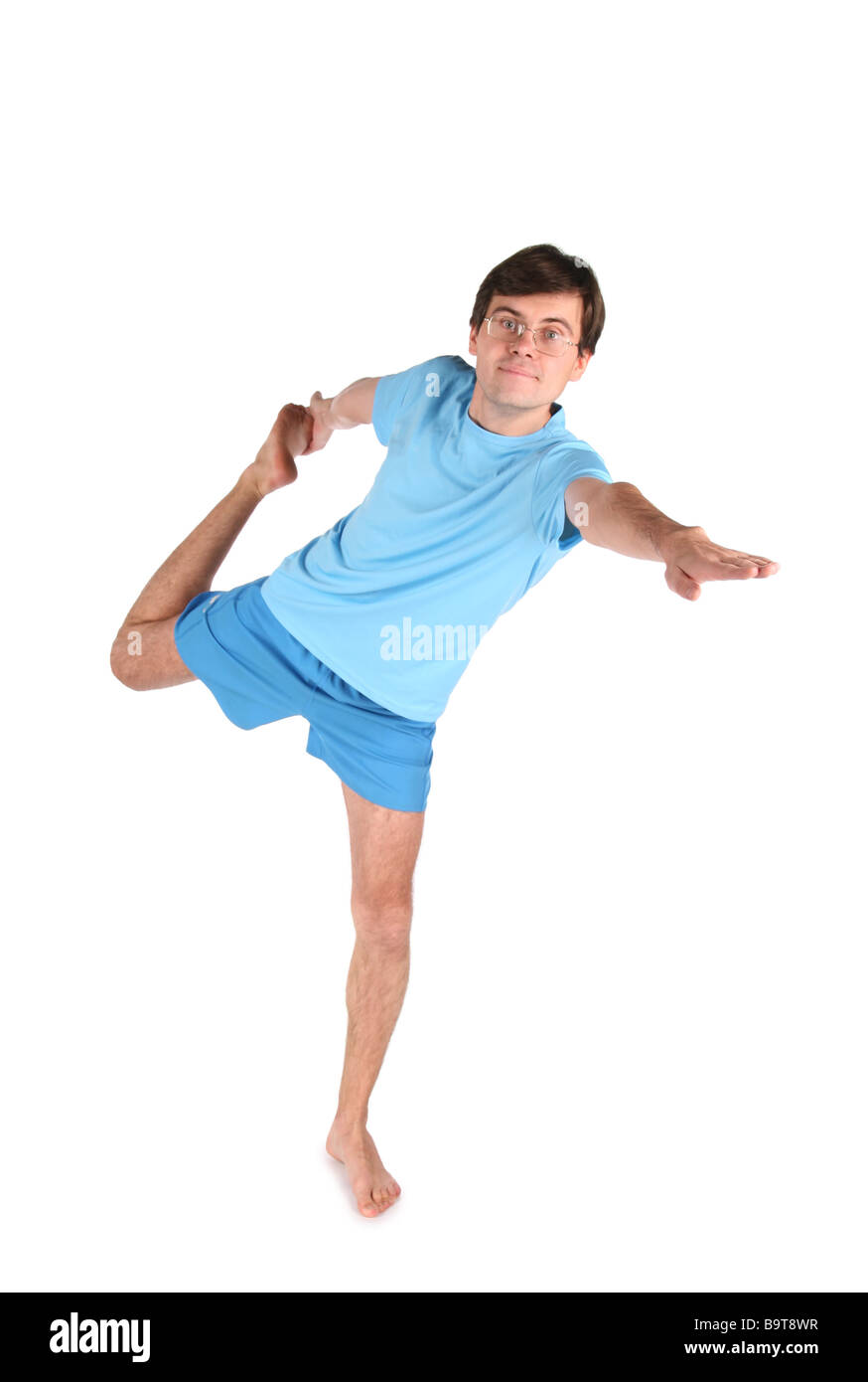 yoga man on one leg Stock Photo - Alamy