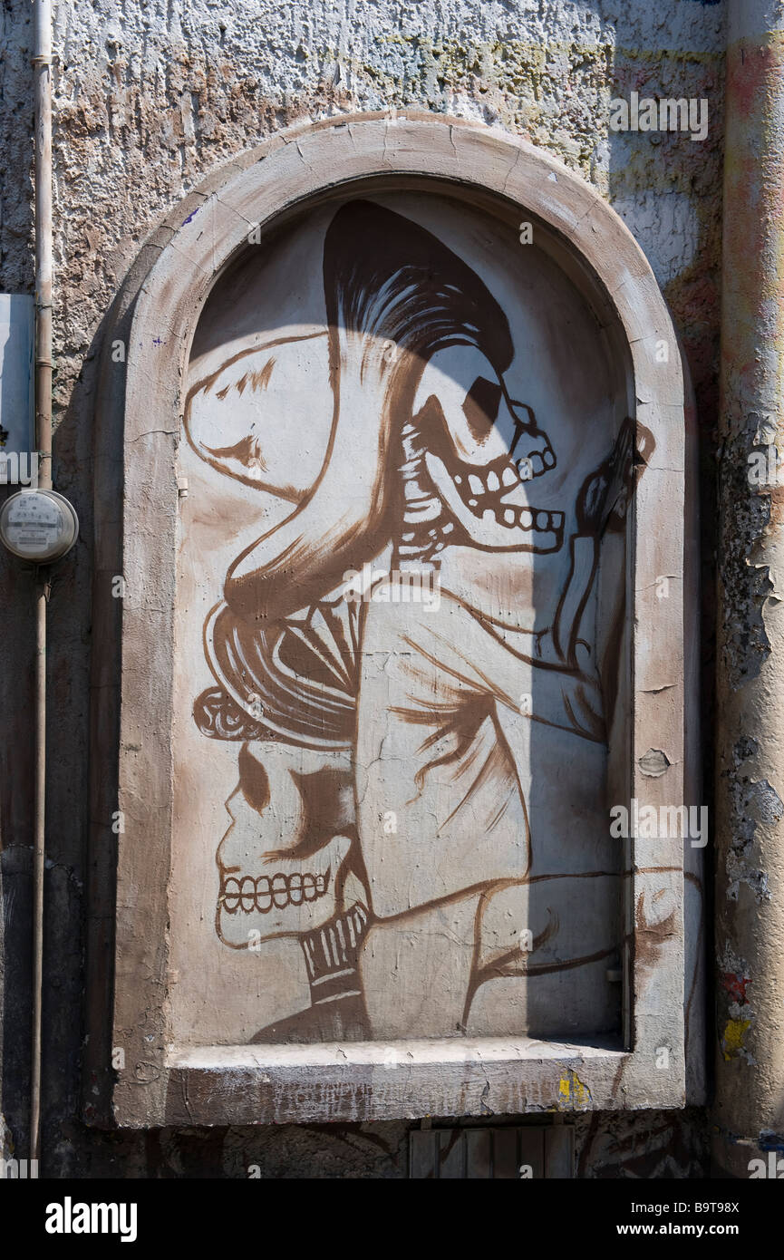Painting of a skeleton, a Mexican icon, in a sombrero on a wall in ...