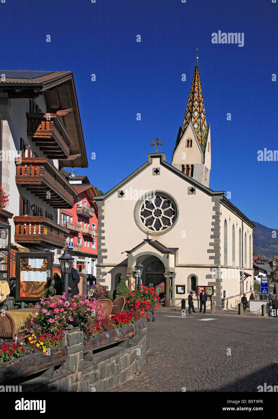 the leaning steeple of Barbian Barbiano Trentino Italy Stock Photo - Alamy
