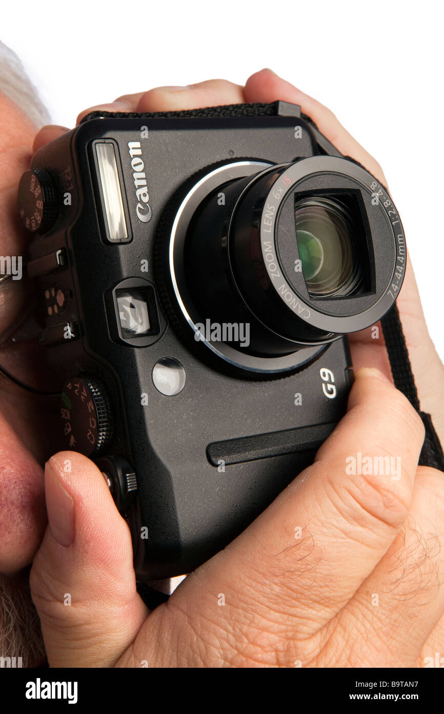 Photography Canon G9 compact 12 mpxl digital camera in use Stock Photo ...