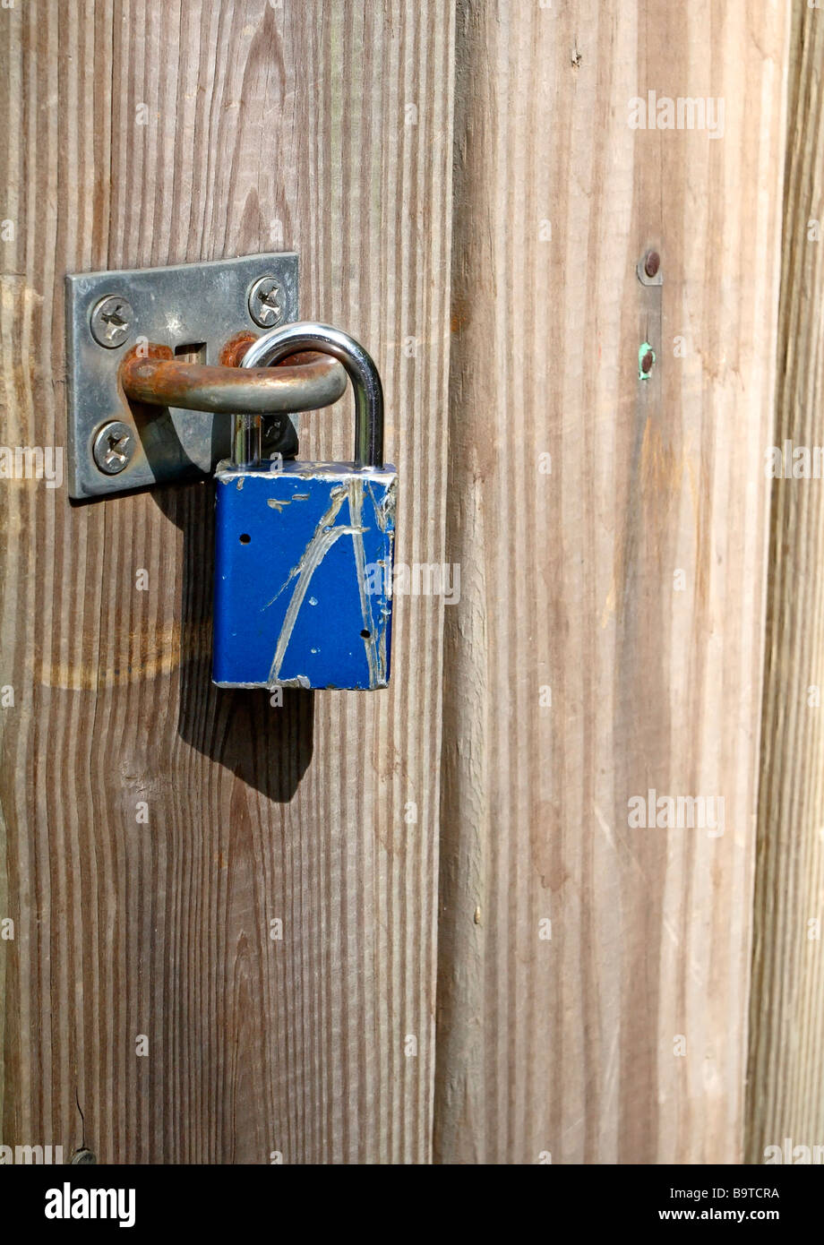 wooden door with padlock Stock Photo - Alamy