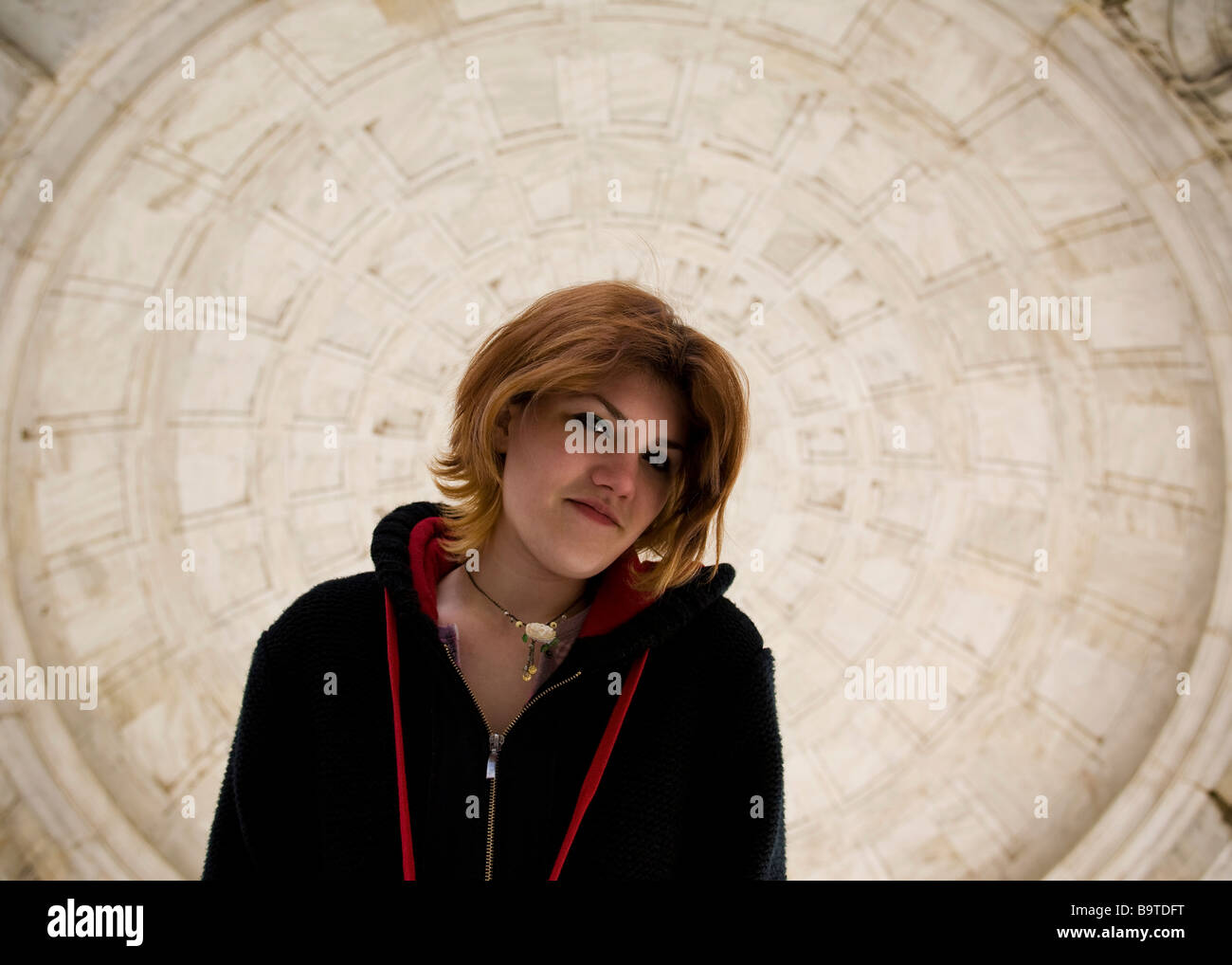 Young Caucasian female under a domed ceiling Stock Photo - Alamy