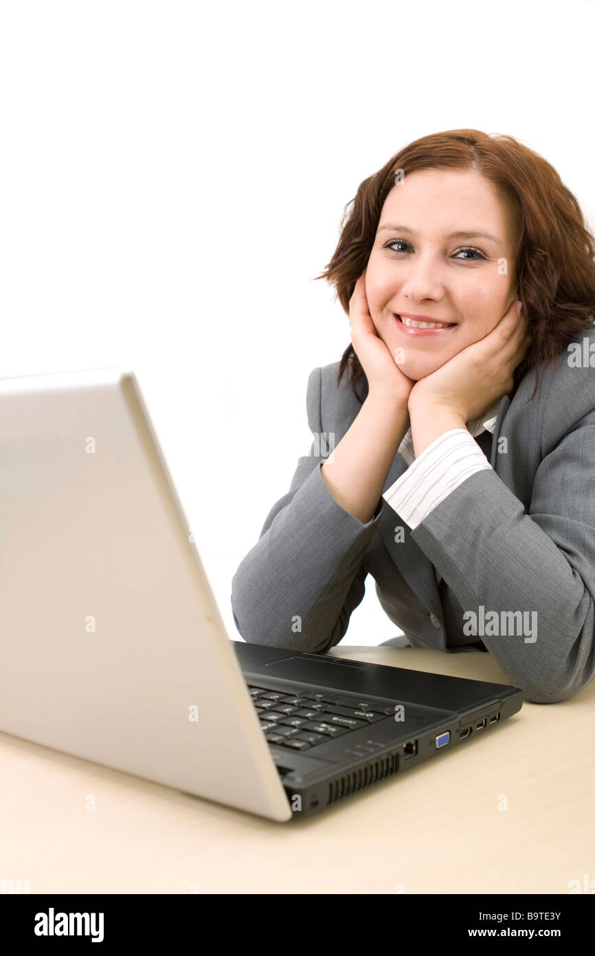 Woman with laptop on a white background Stock Photo - Alamy