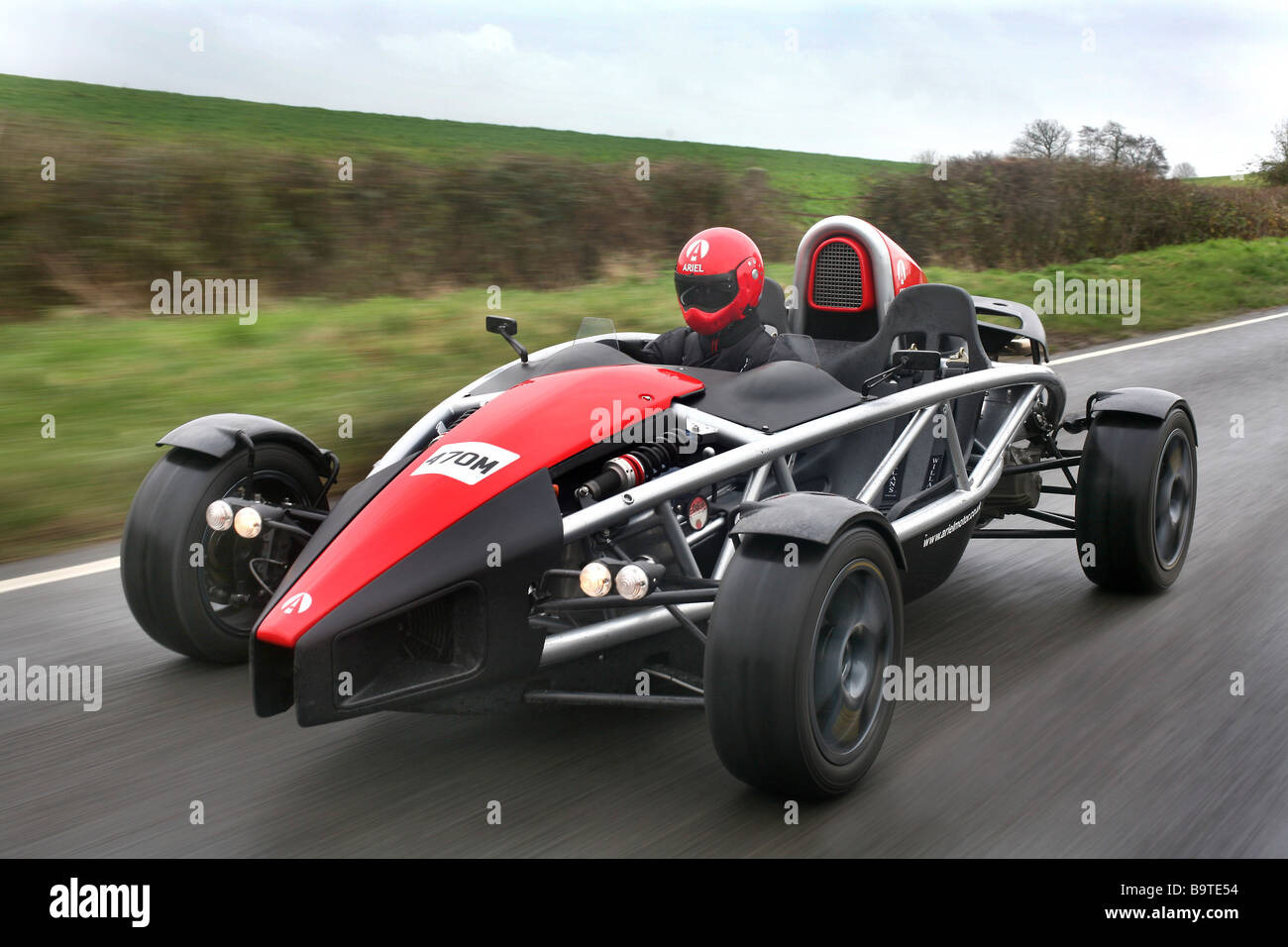 An early Ariel Atom at speed on the road Stock Photo - Alamy