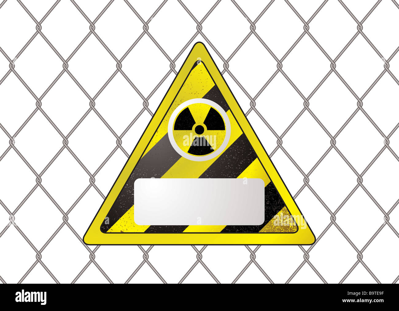 triangular nuclear sign attached to a wire fence with copy space Stock ...