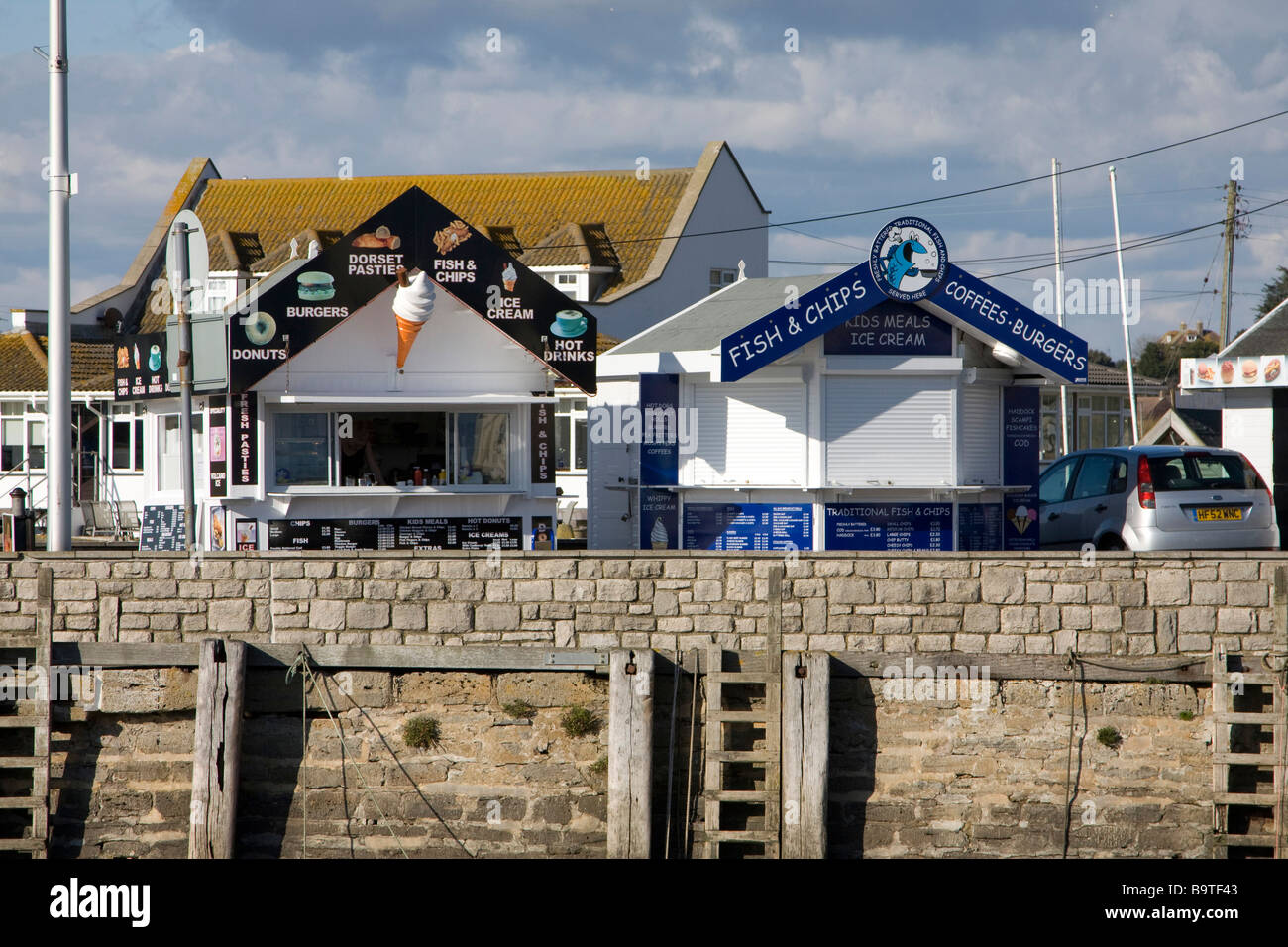 fish chip shops west bay dorset england uk gb Stock Photo - Alamy