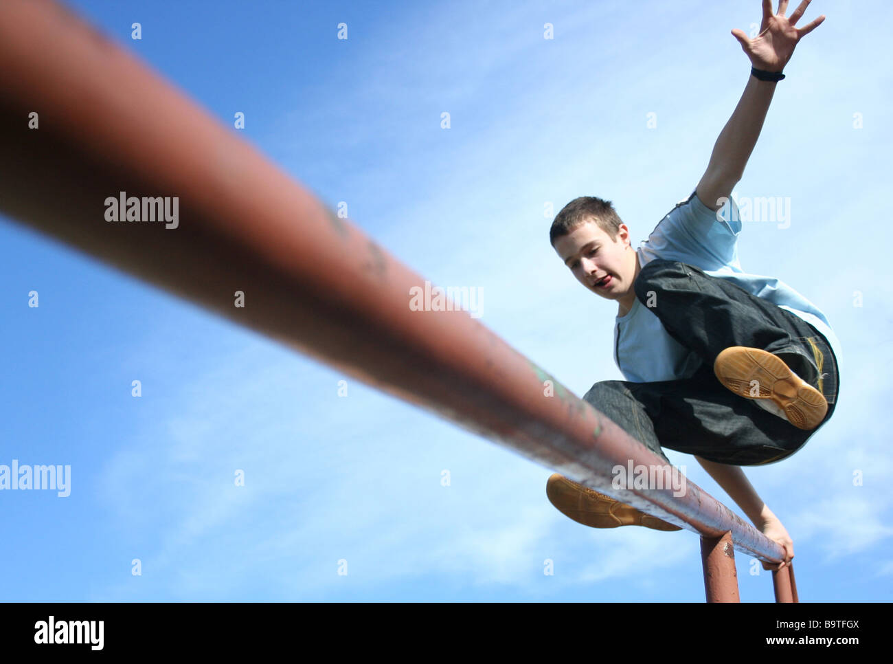 Happy teenager jumping Stock Photo - Alamy