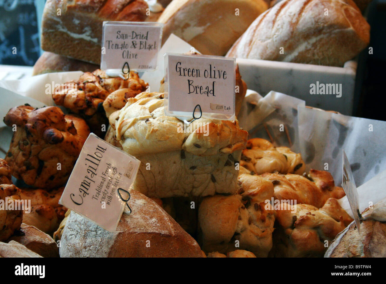 Bread on display at a bakery in Bath, Somerset, England Stock Photo - Alamy