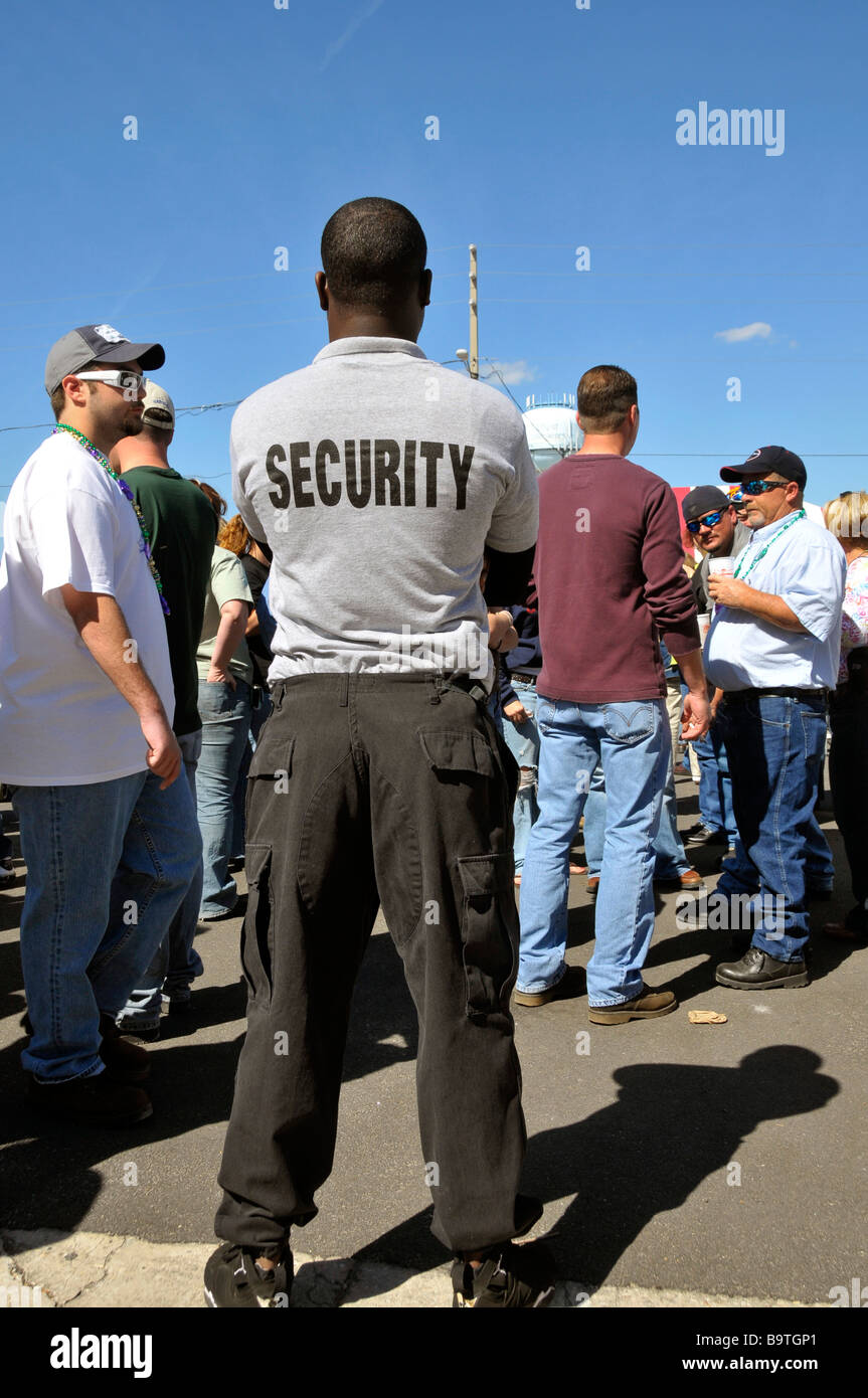 African American Male Security Guard controls crowd at Lake Wales Mardi ...
