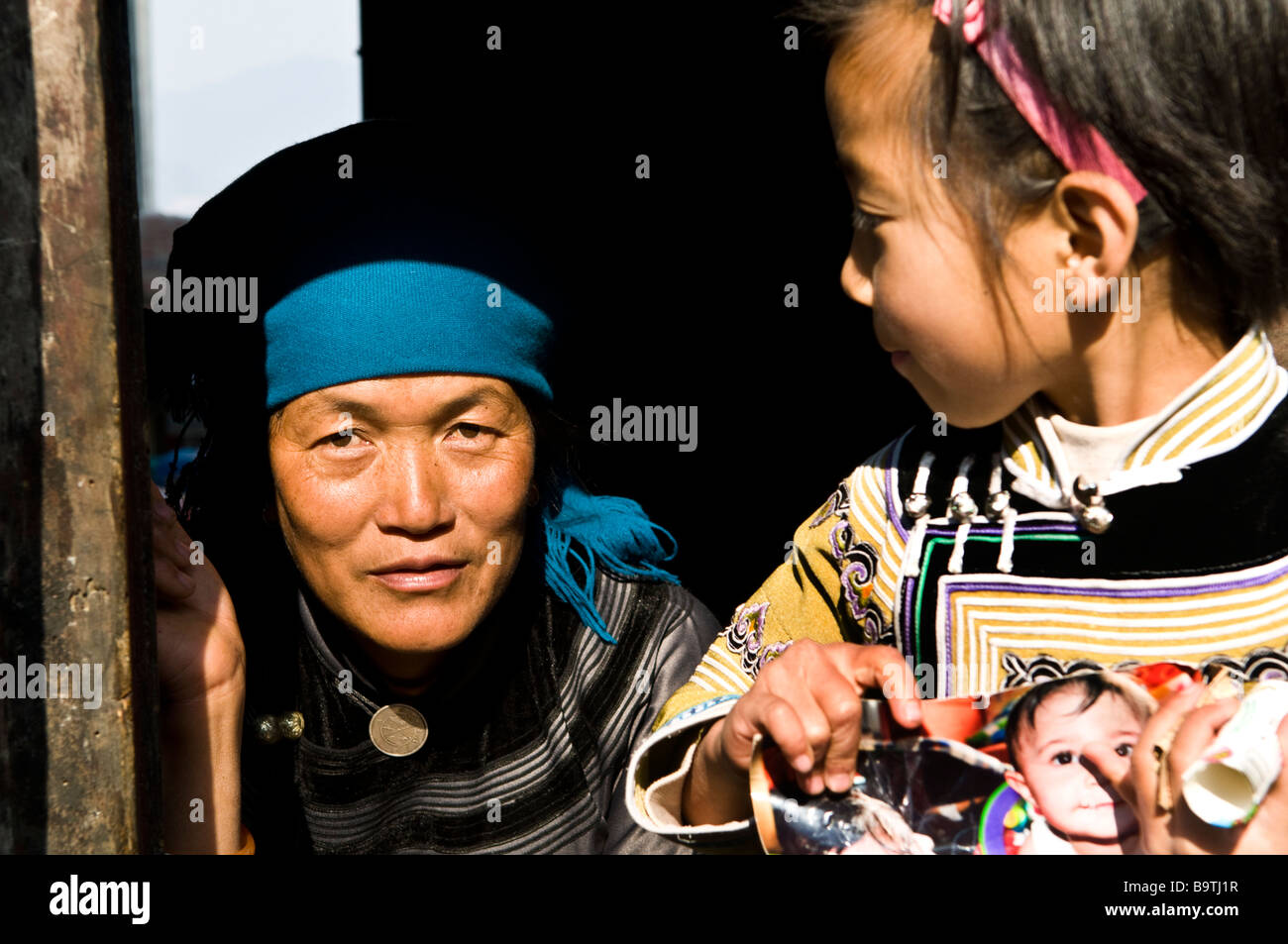 Akha / Hani ( Hani is the minority name in China ) family outside their ...