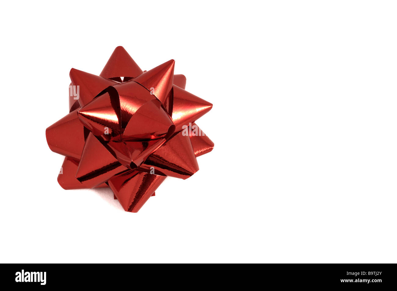 Red shiny ribbon on a white background Stock Photo - Alamy
