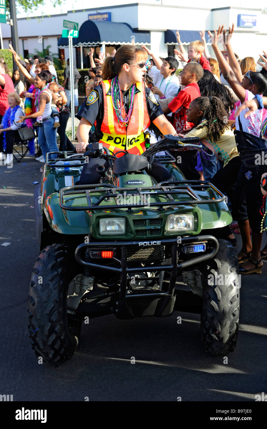 White Female Police Officer Rides Gator Vehicle Through Crowd at Lake ...