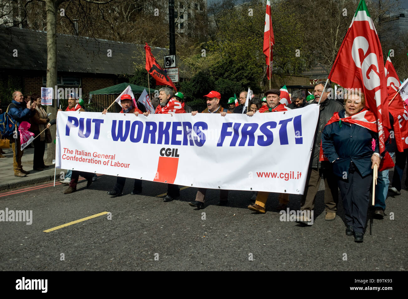 People marching with banner hi-res stock photography and images - Alamy